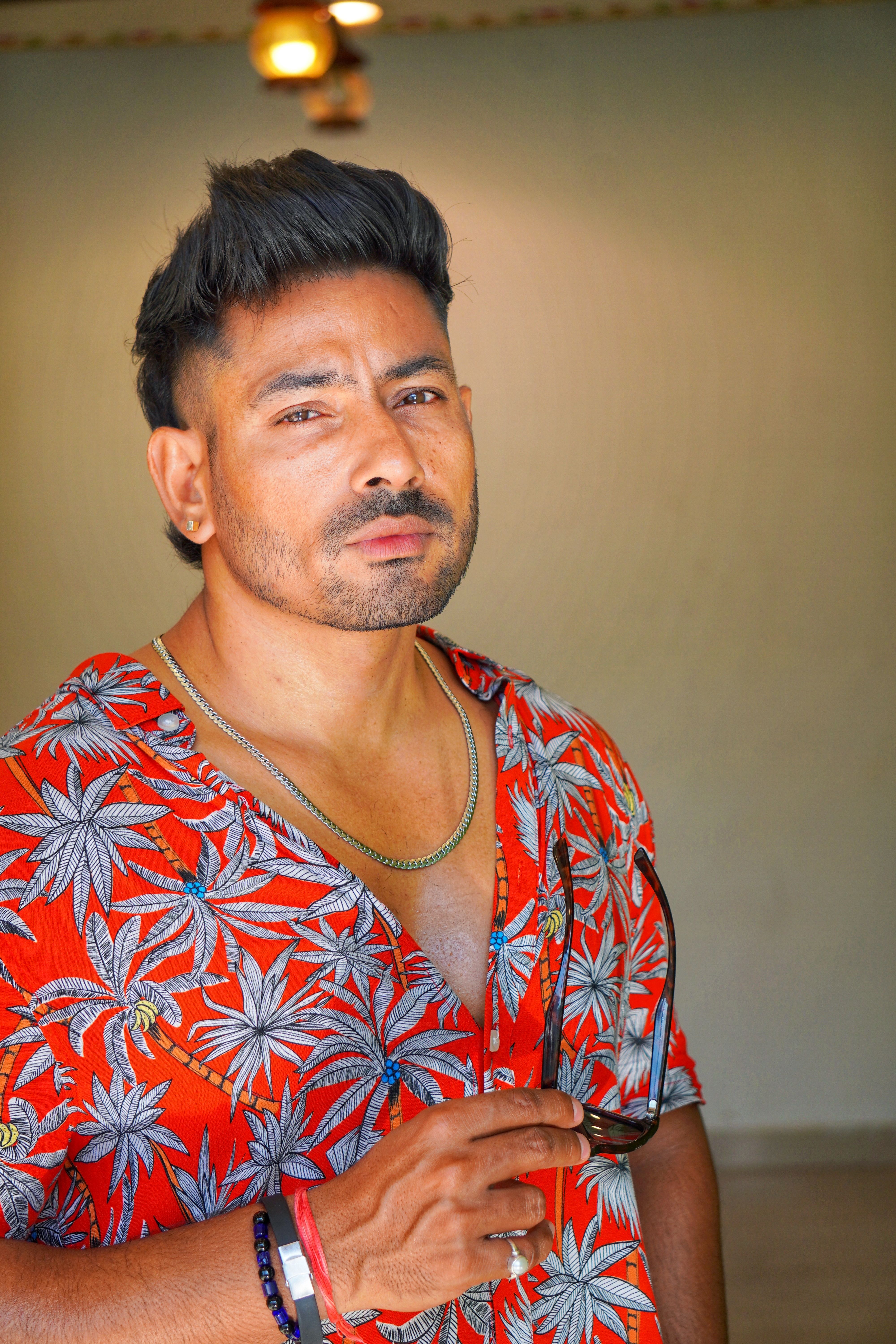 Portrait of Man Wearing Colorful Shirt · Free Stock Photo