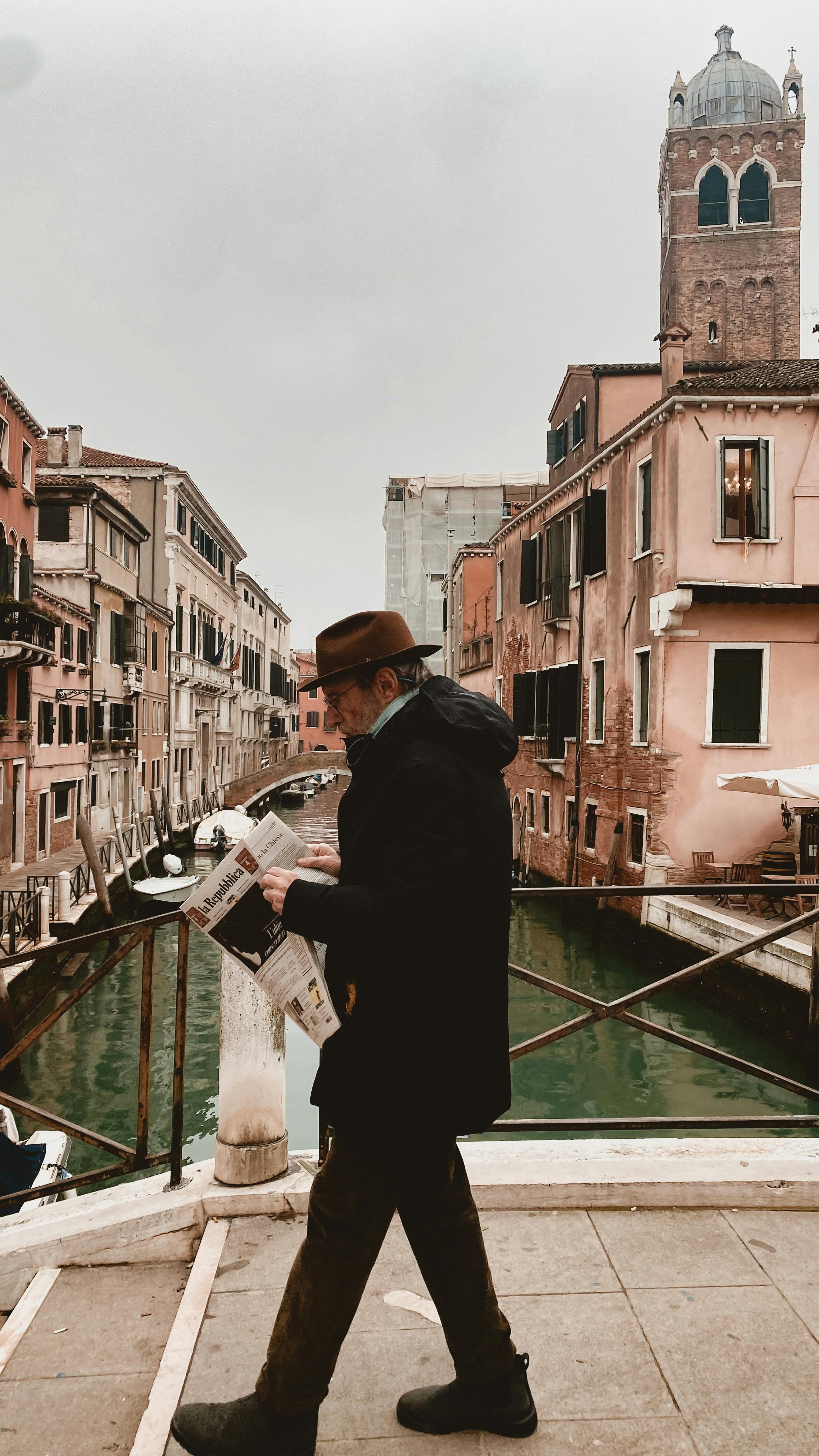 Man with Newspaper in Venice · Free Stock Photo