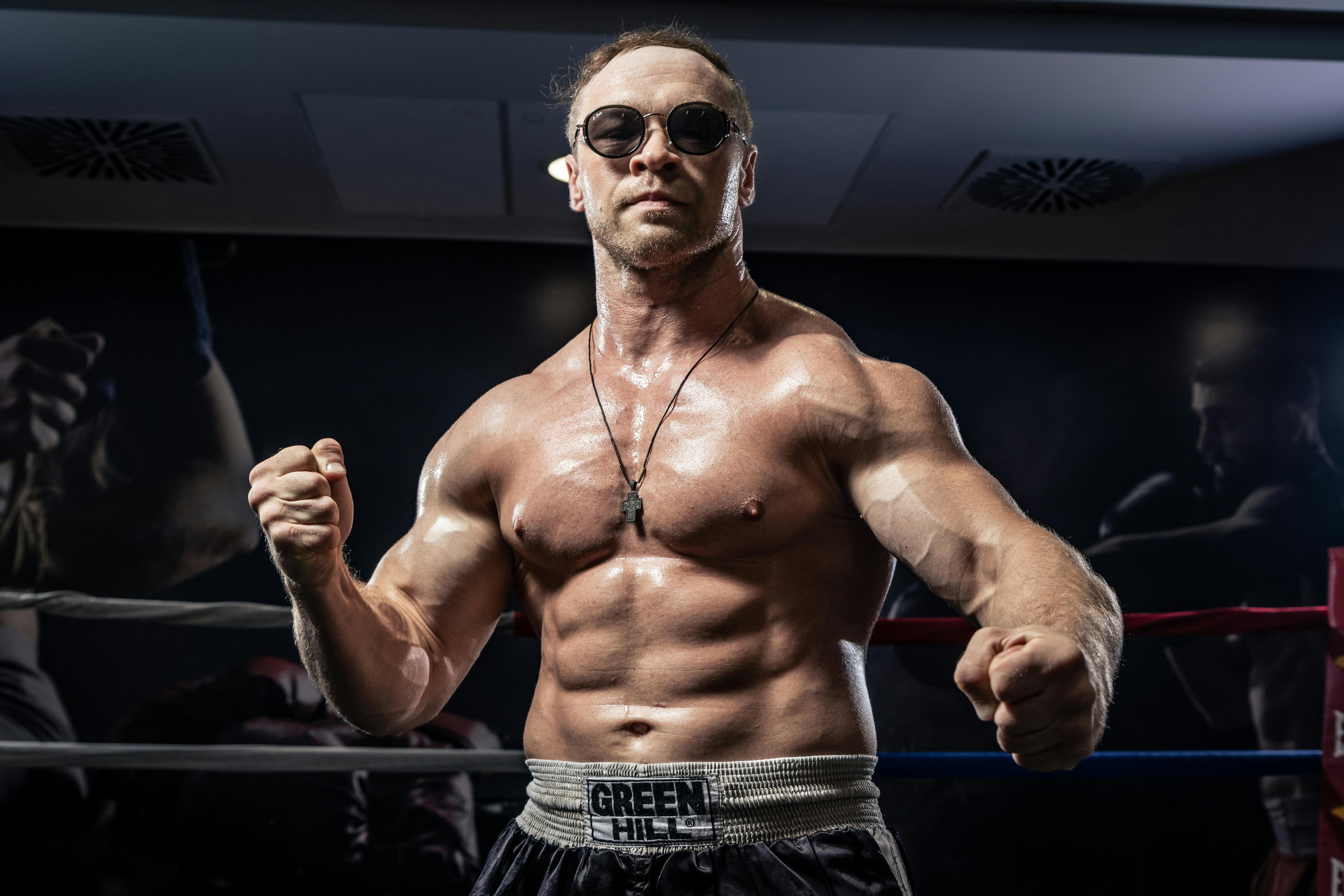 Muscular Men Standing Standing in Boxing Ring · Free Stock Photo