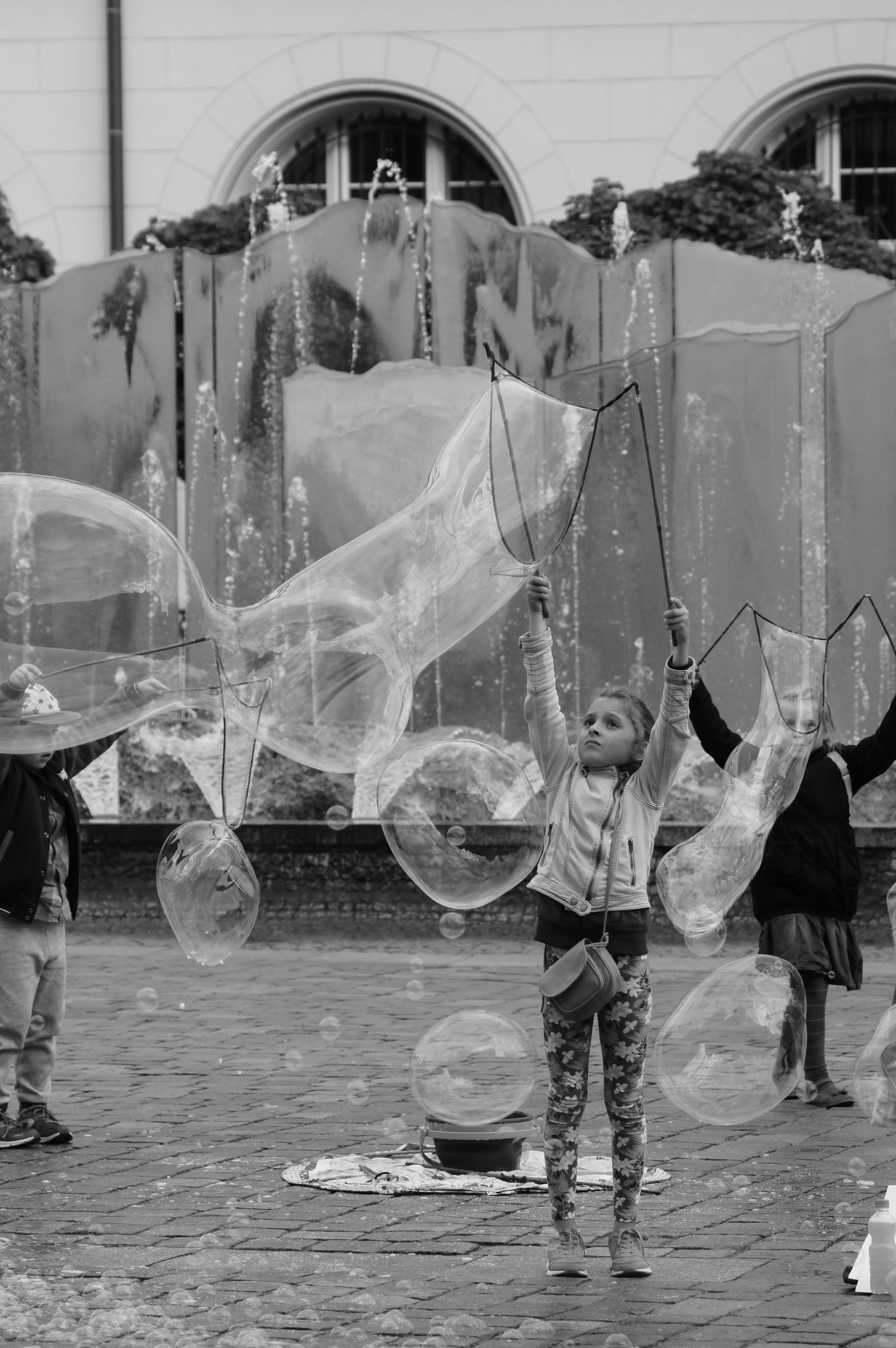 Children Running in Water Splashing from a Water Sprinkler · Free Stock ...