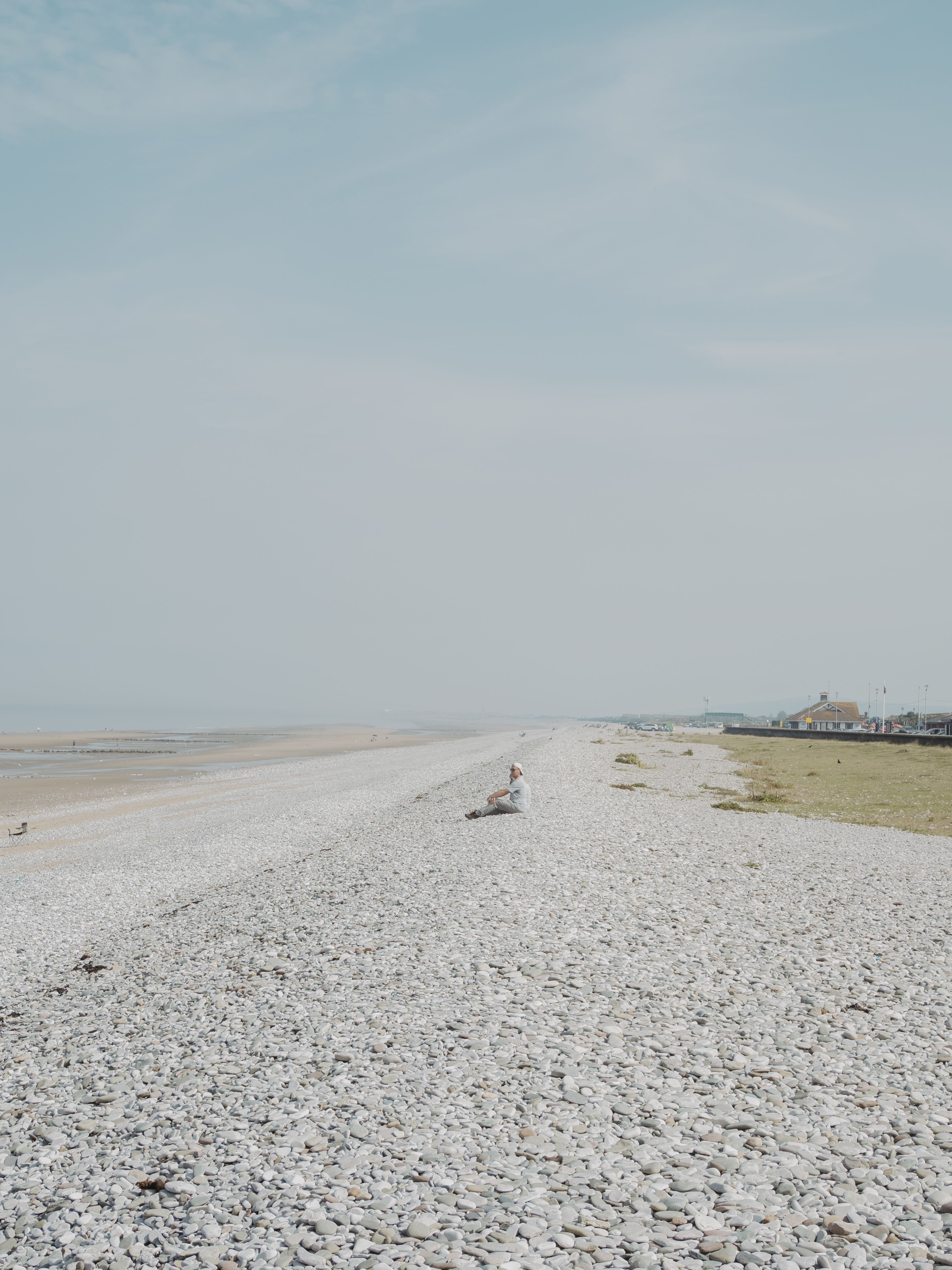 Person Relaxing at Beach · Free Stock Photo