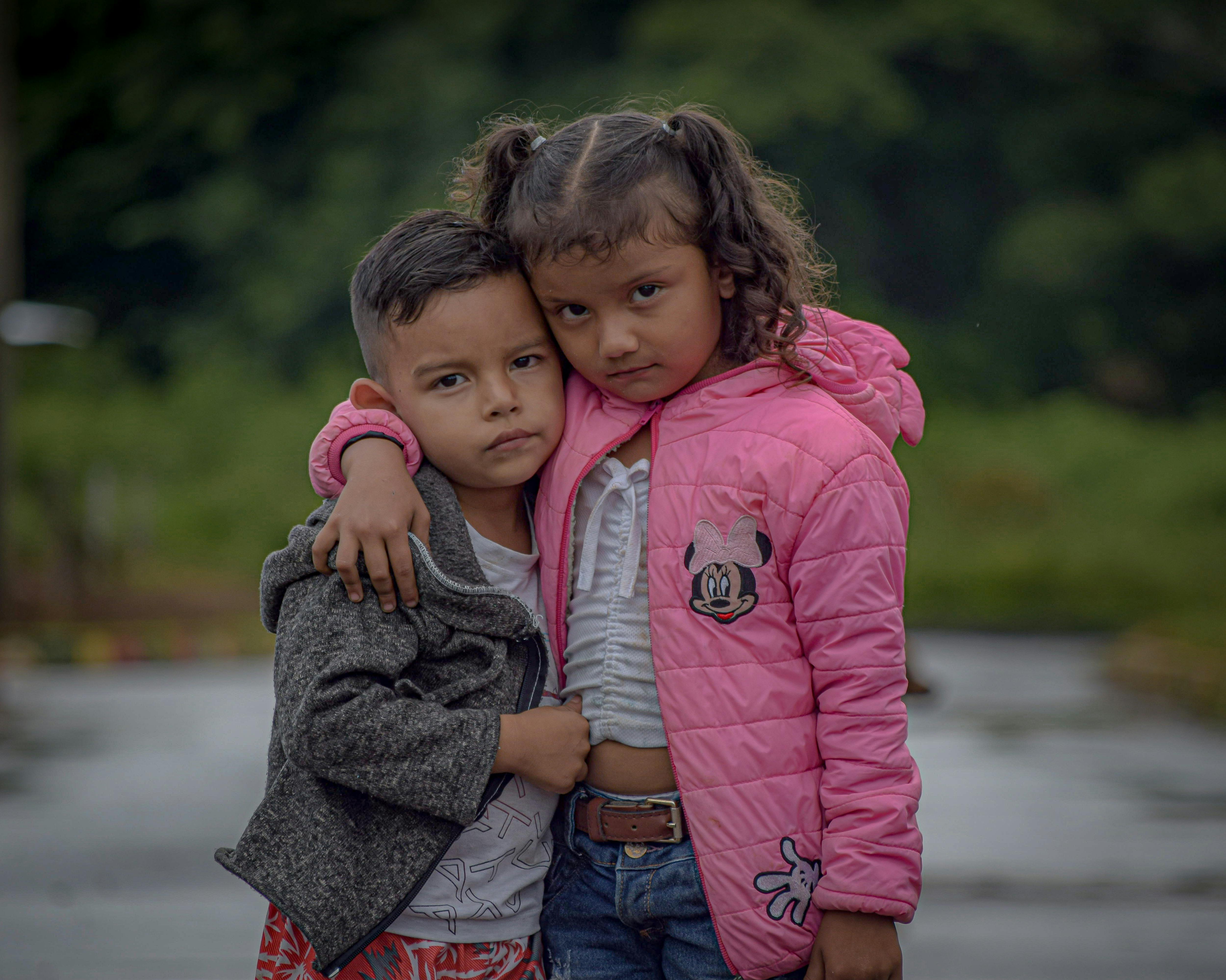 Siblings Standing Together · Free Stock Photo