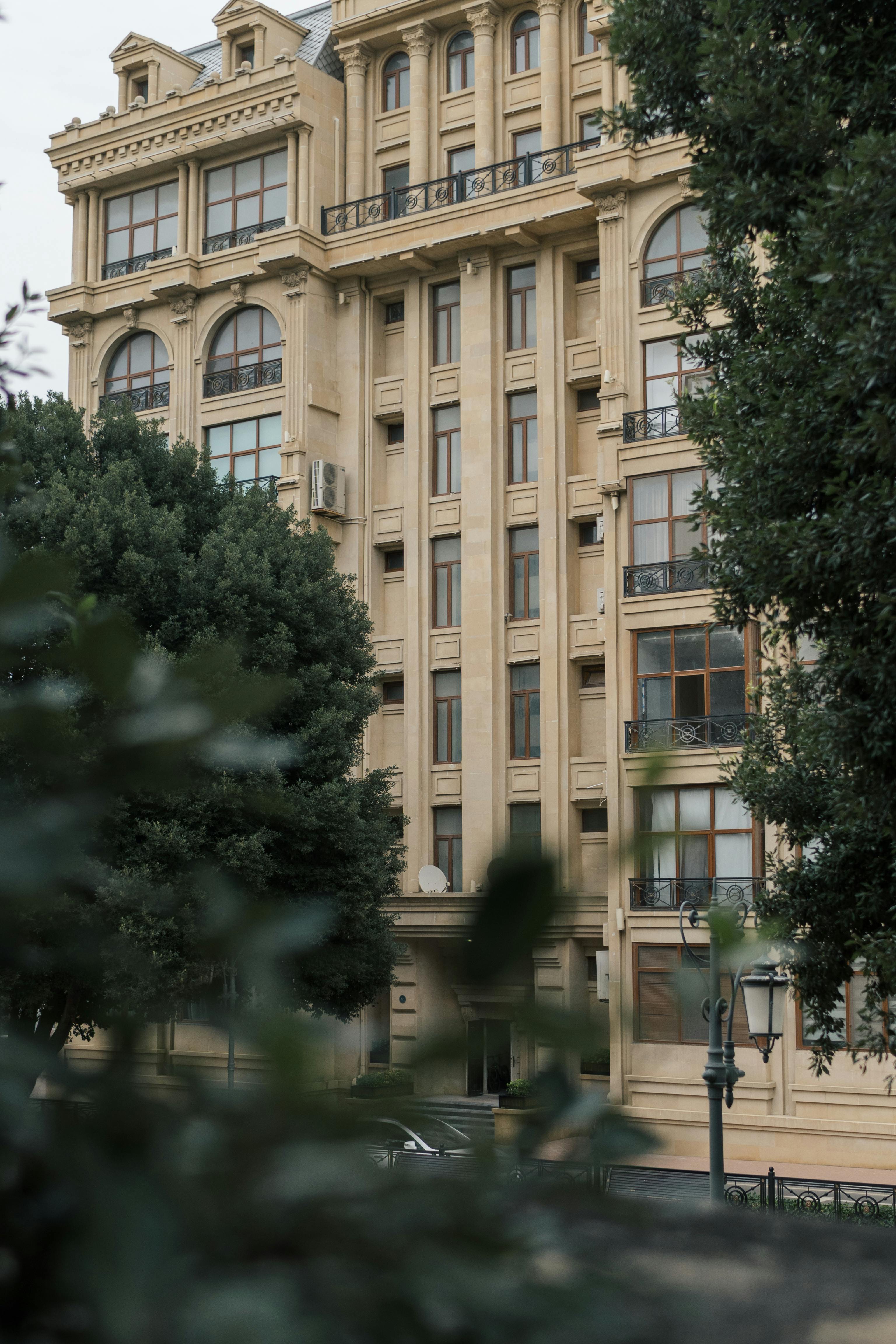 Building behind Trees in Baku · Free Stock Photo
