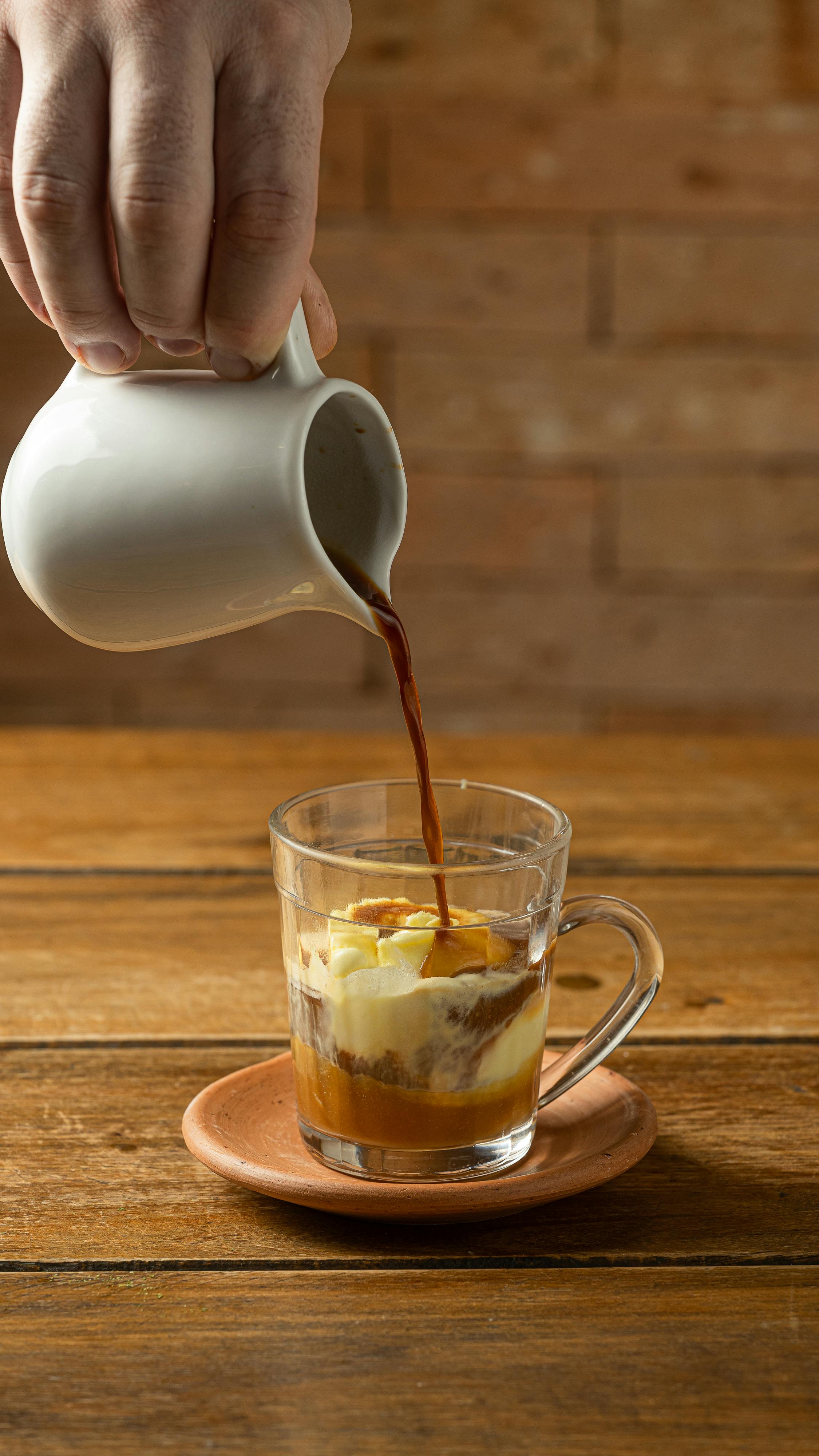 Pouring from Pitcher to Glass · Free Stock Photo