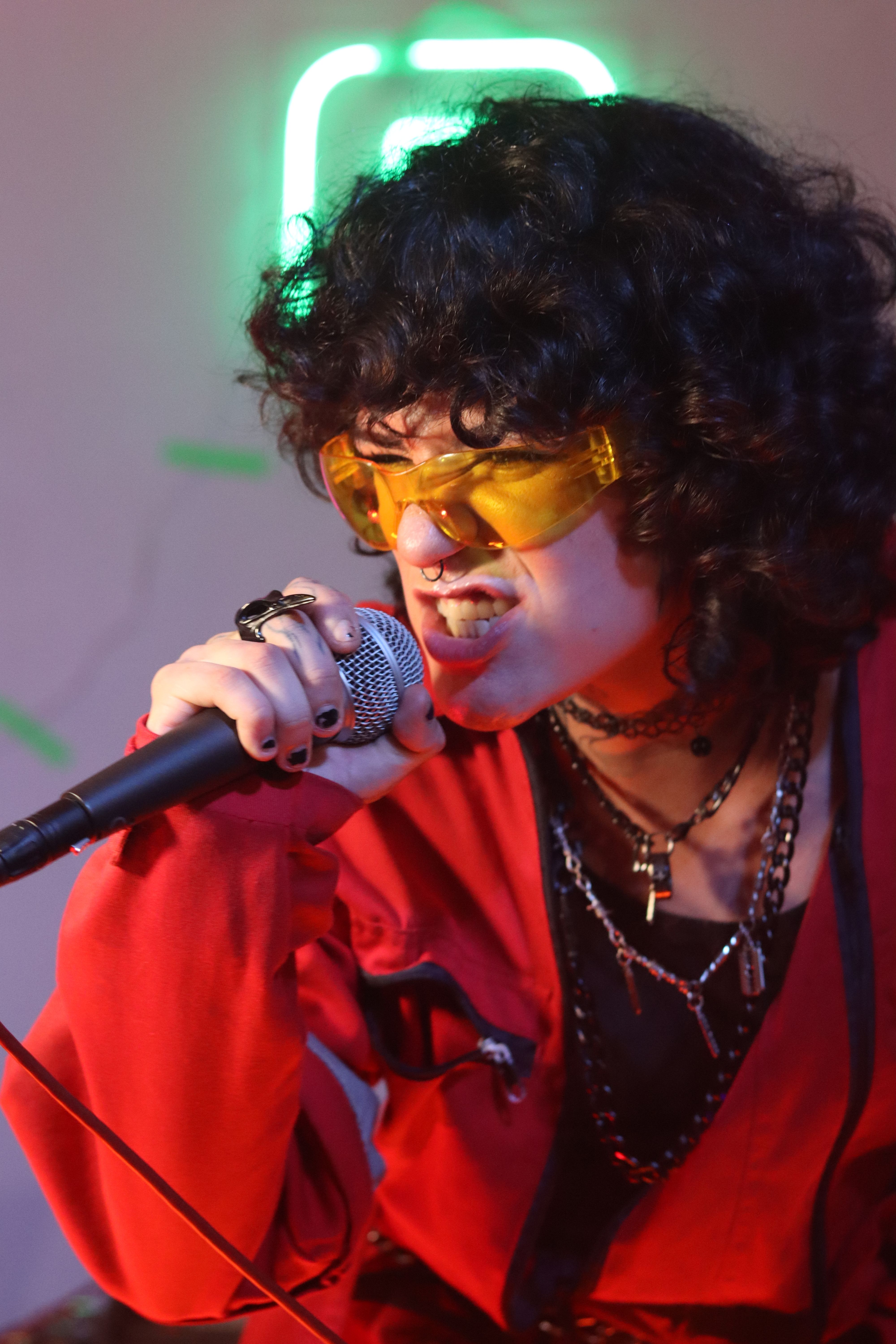 Woman in Eyeglasses Singing · Free Stock Photo