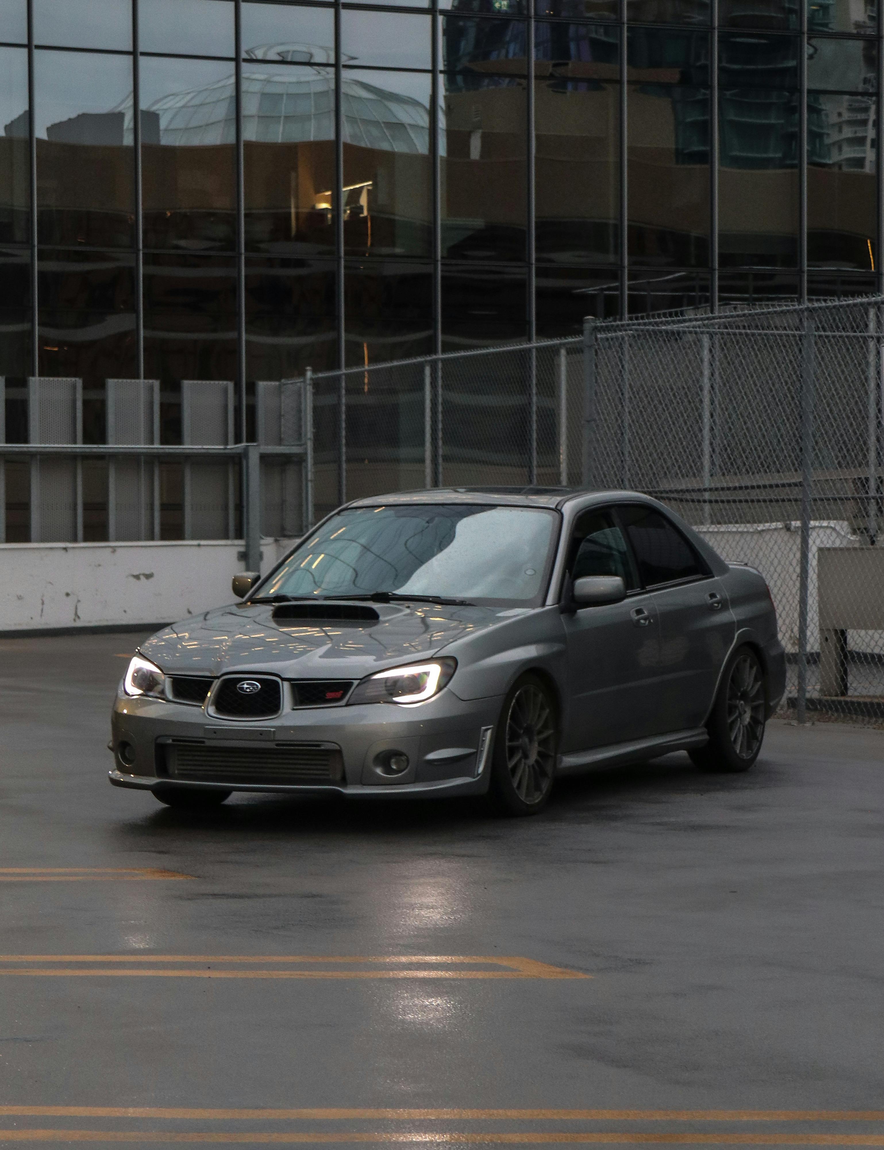 Sapphire Blue Subaru Impreza Parked on a Cobblestone Street · Free ...