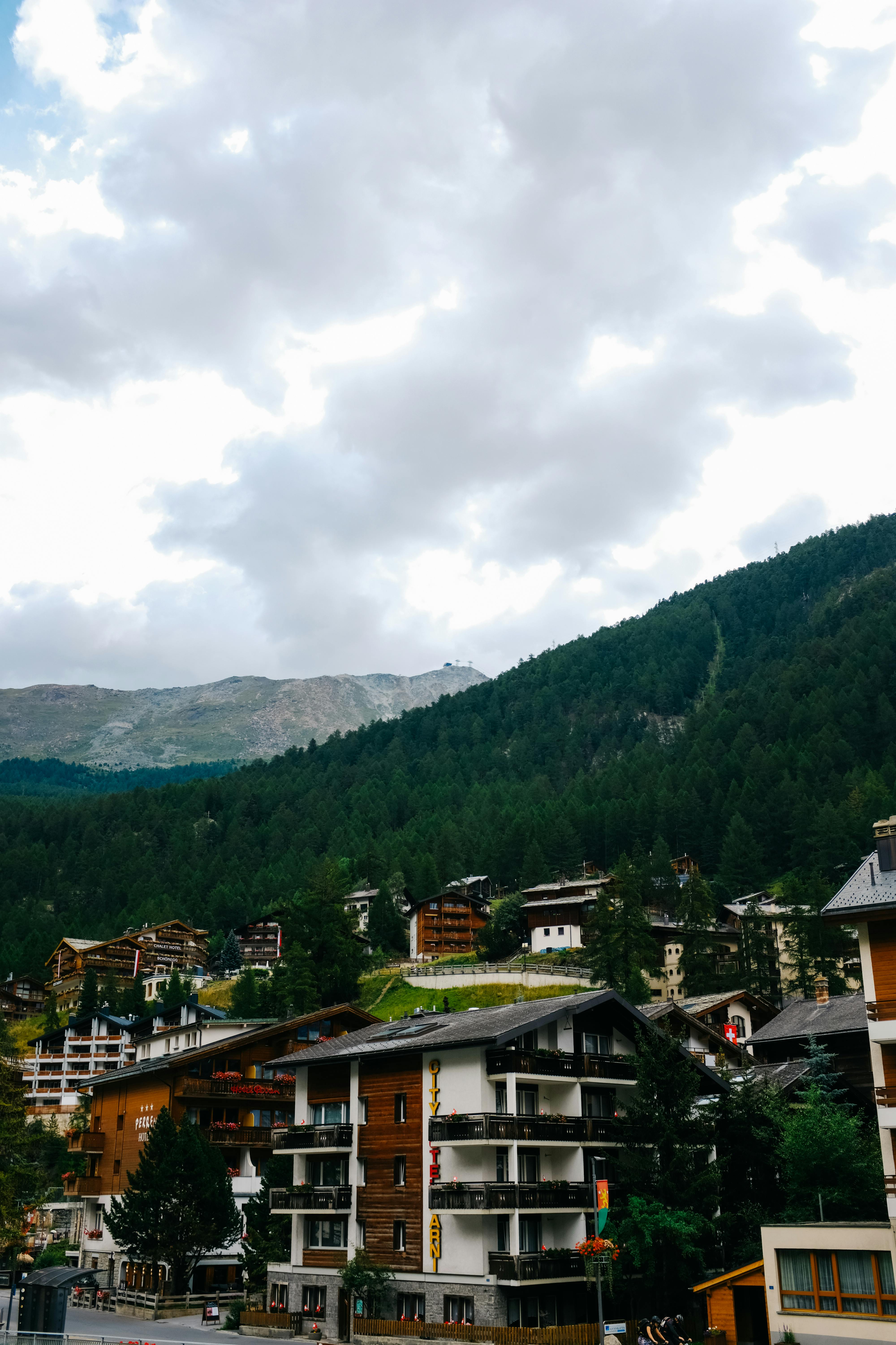 Cascading Body of Water Under Sky With Clouds · Free Stock Photo