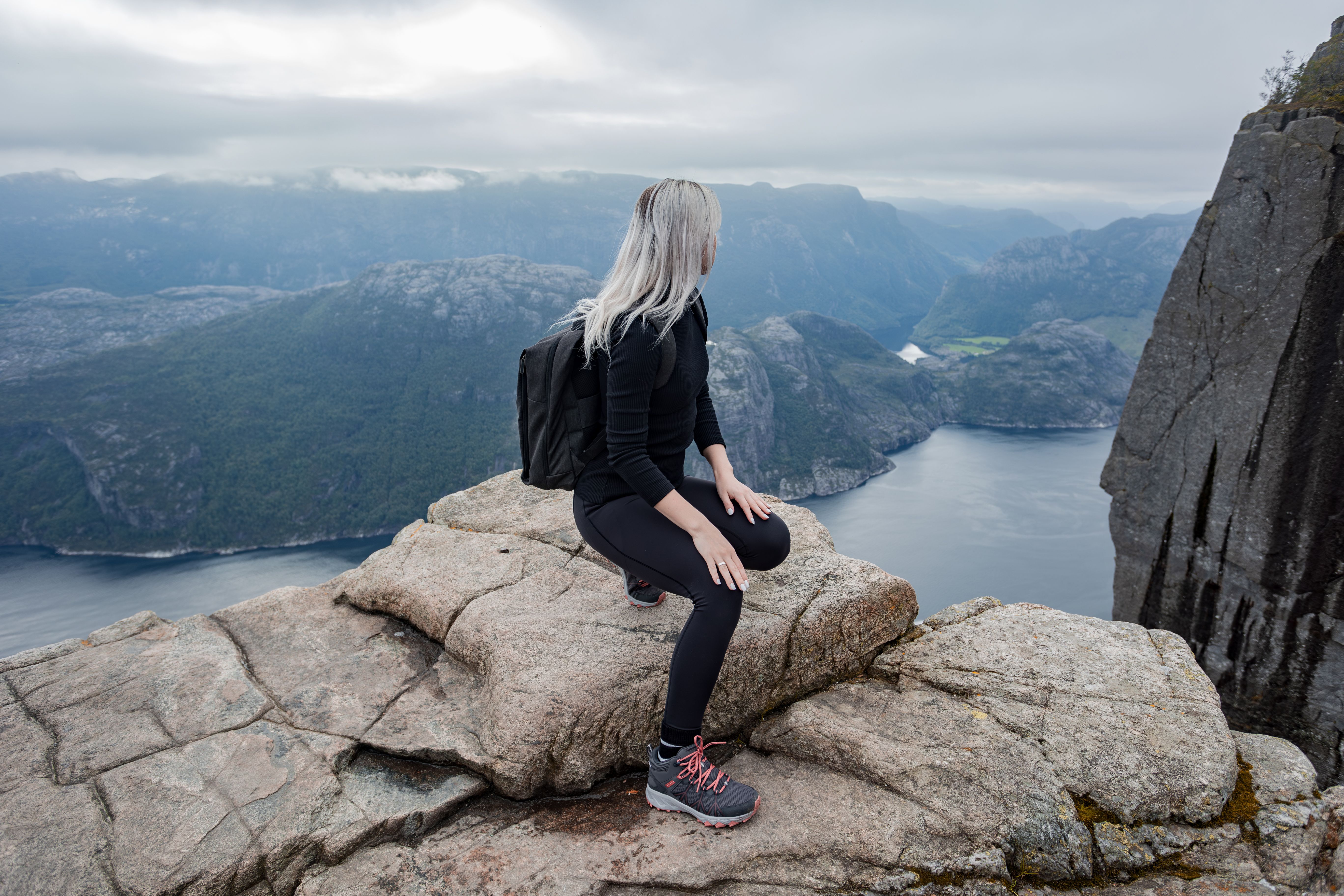 People Sitting on the Edge of a Cliff · Free Stock Photo