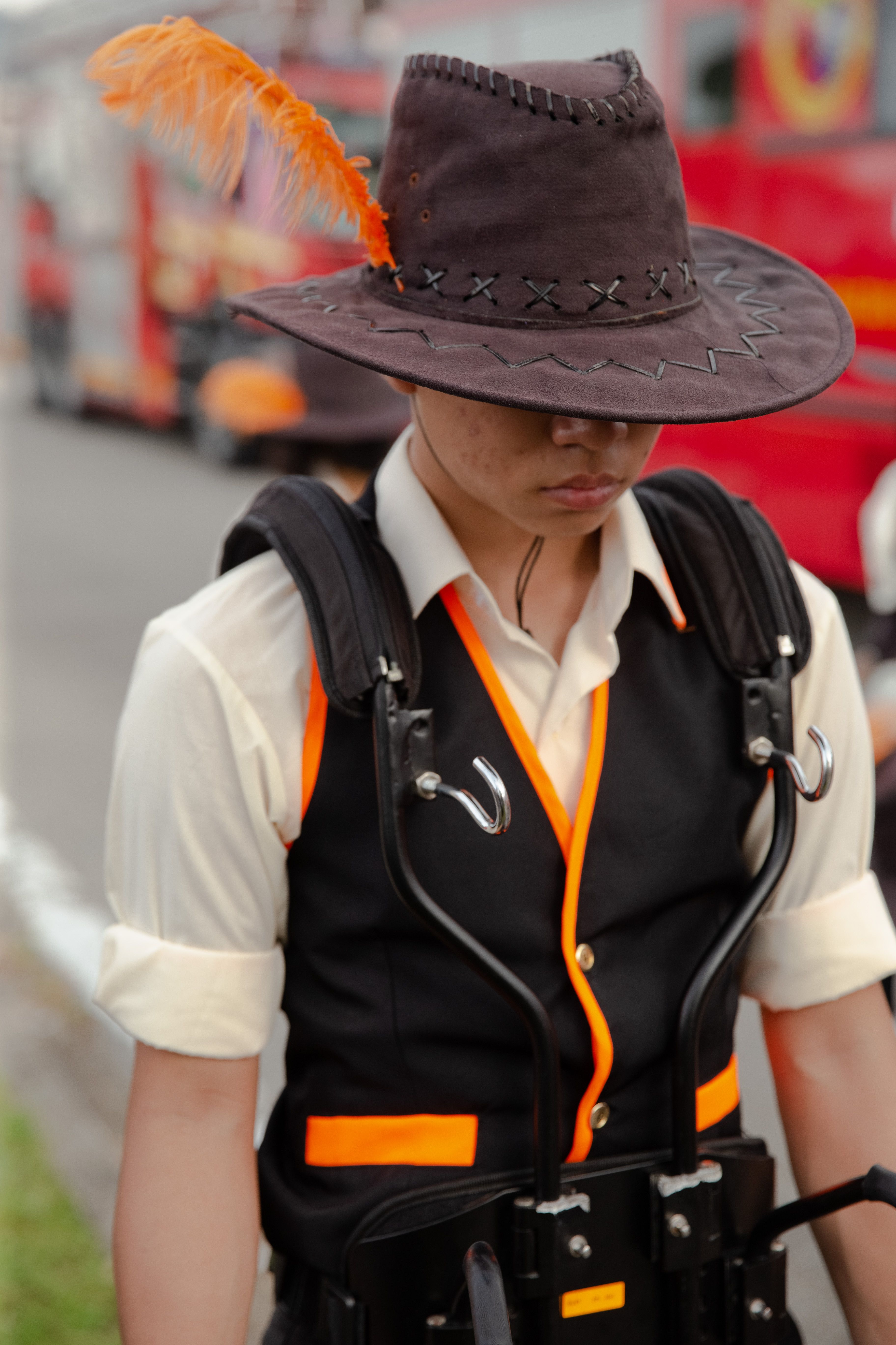 Person in Hat with Feather and in Vest · Free Stock Photo