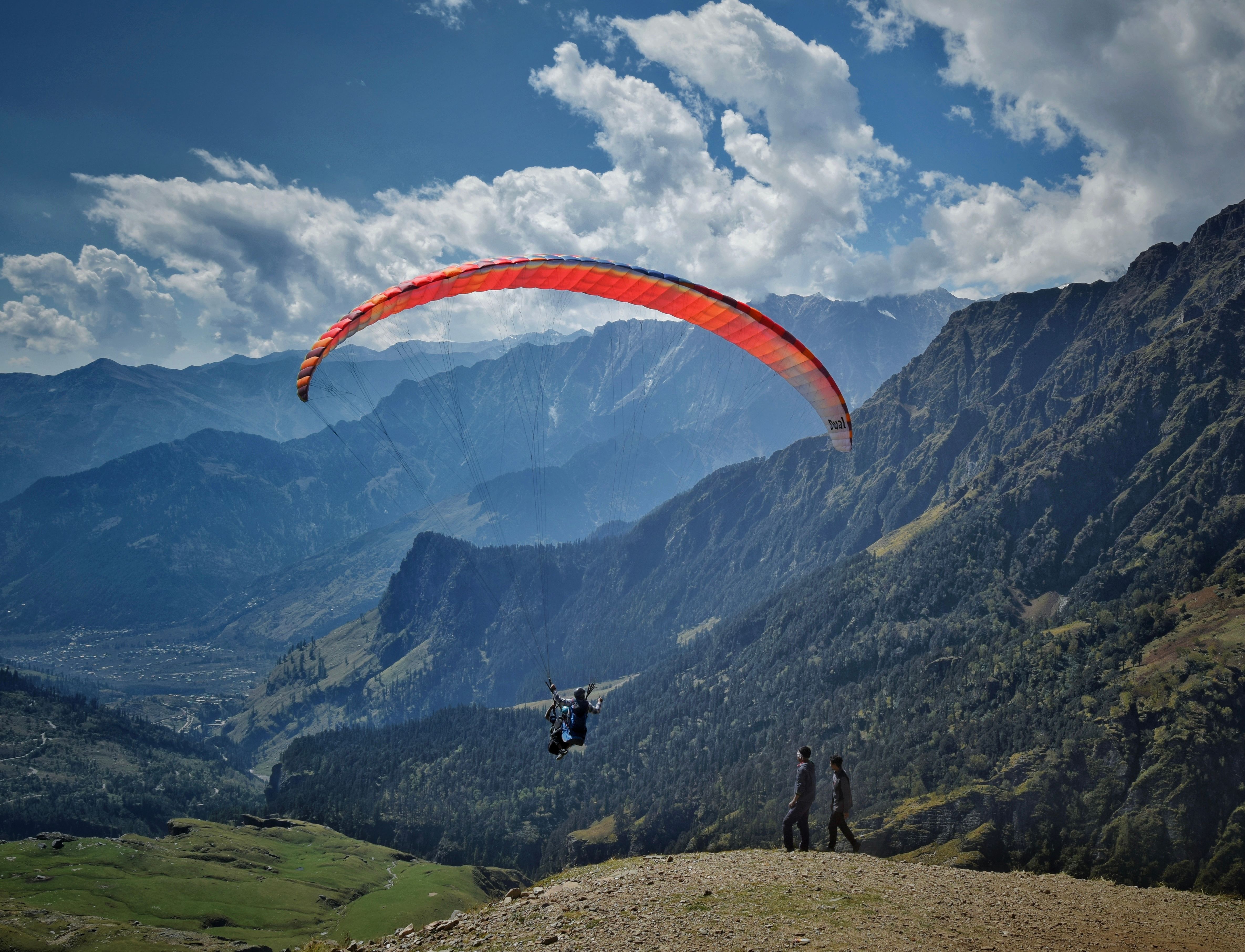 People Paragliding in Mountains · Free Stock Photo