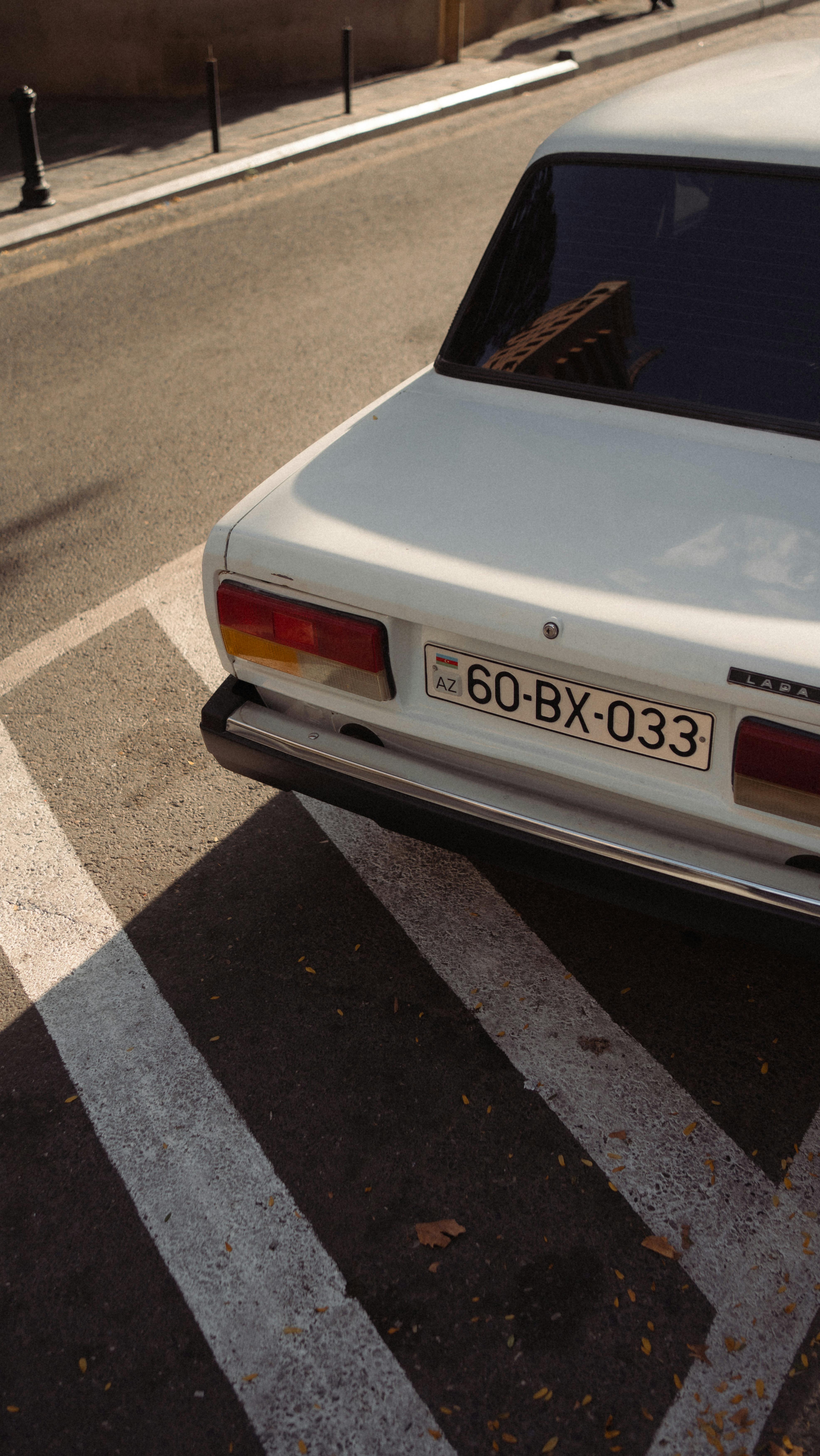 White Lada Riva Parked on the Street · Free Stock Photo