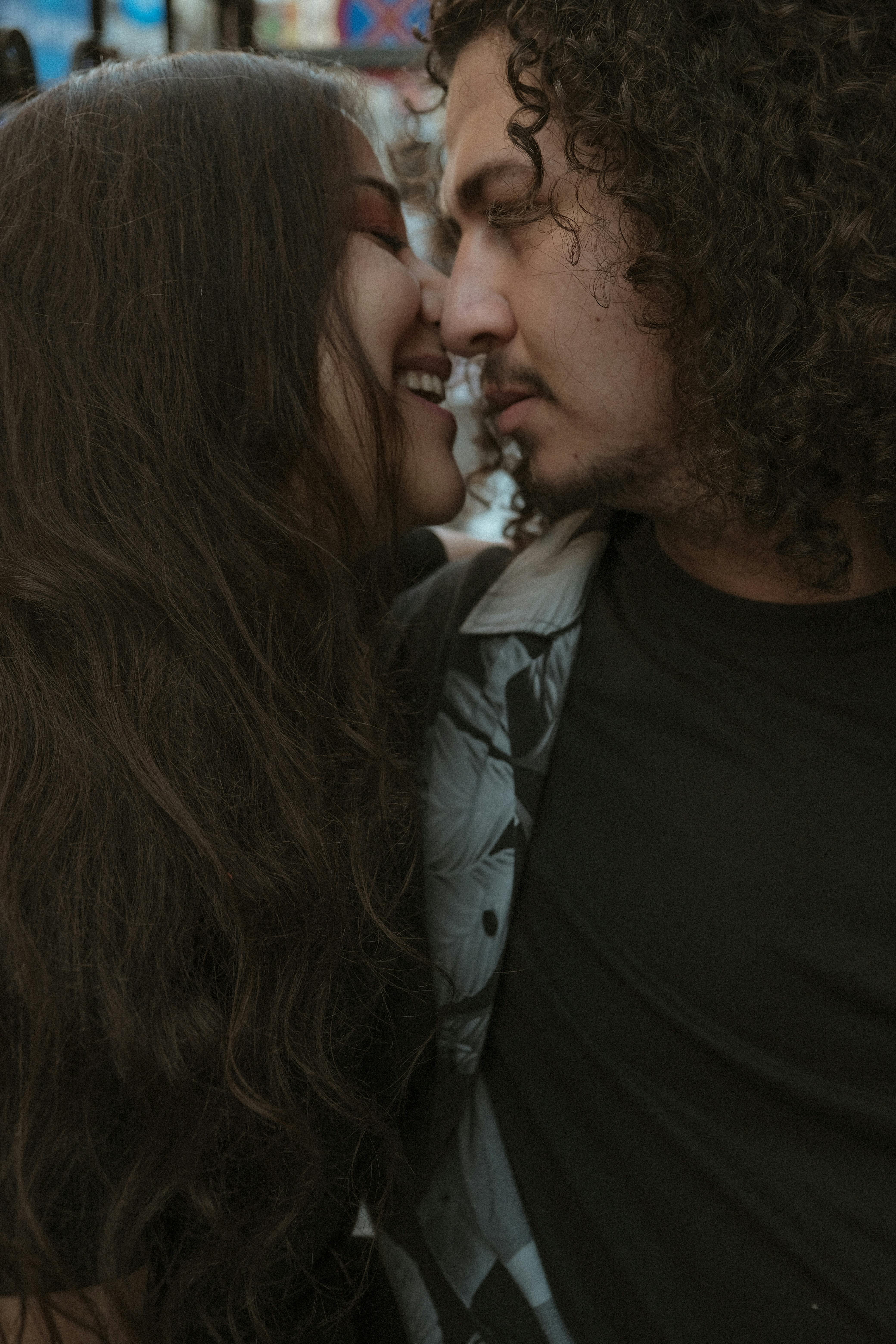 Couple Leaning in for a Kiss · Free Stock Photo