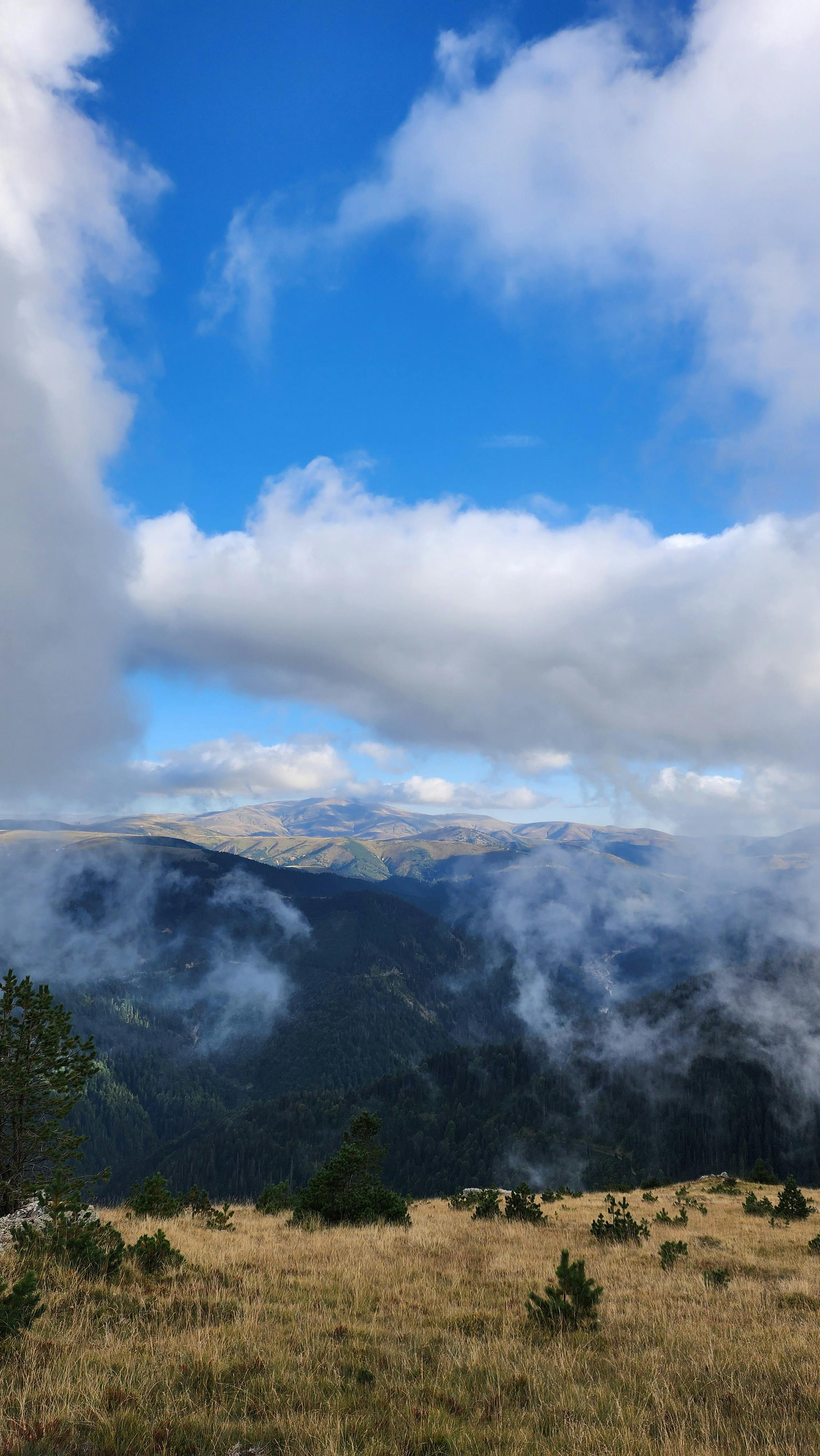 Clouds and Mist Covering a Mountain · Free Stock Photo