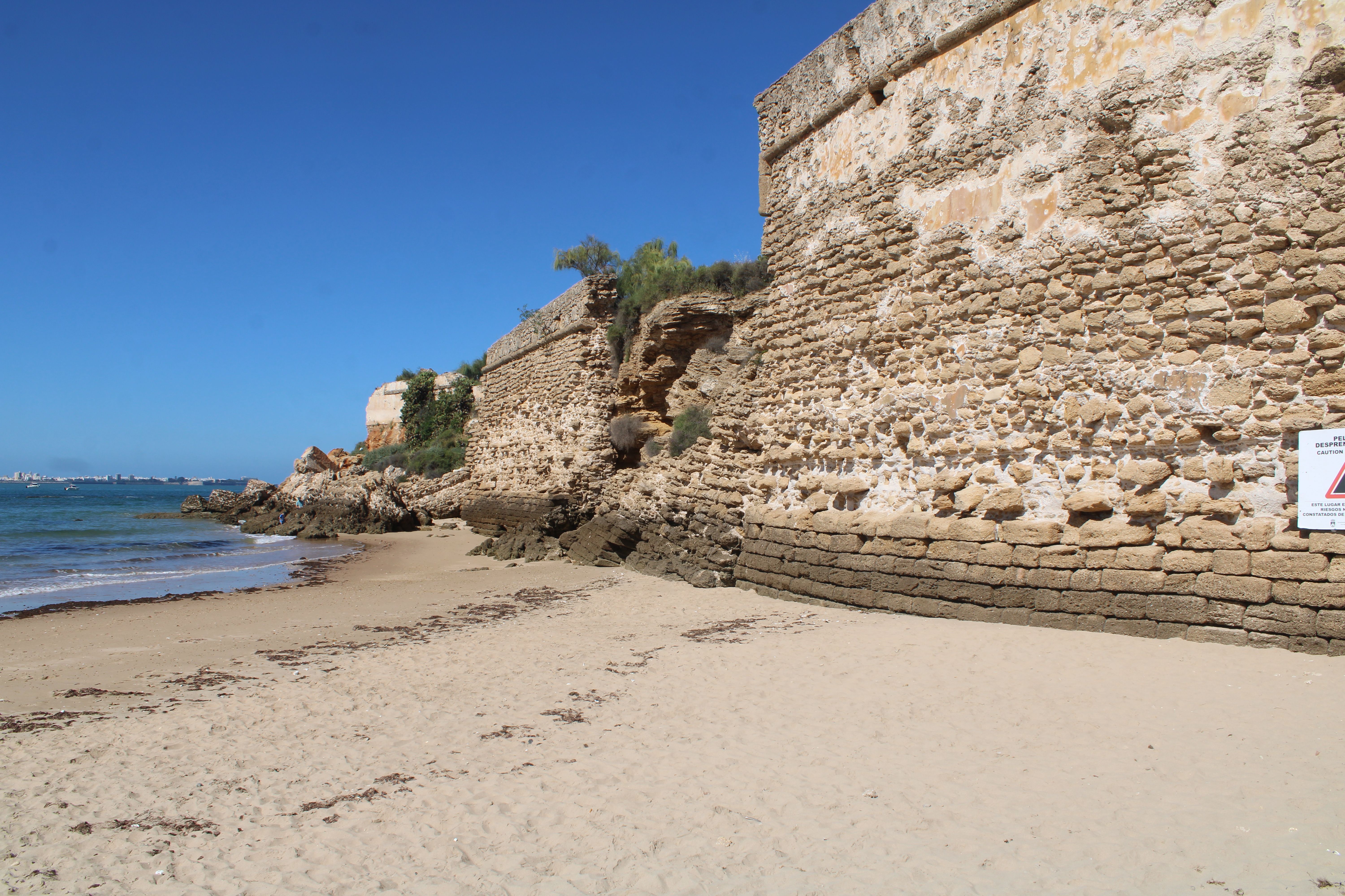 Stone Wall on a Beach · Free Stock Photo