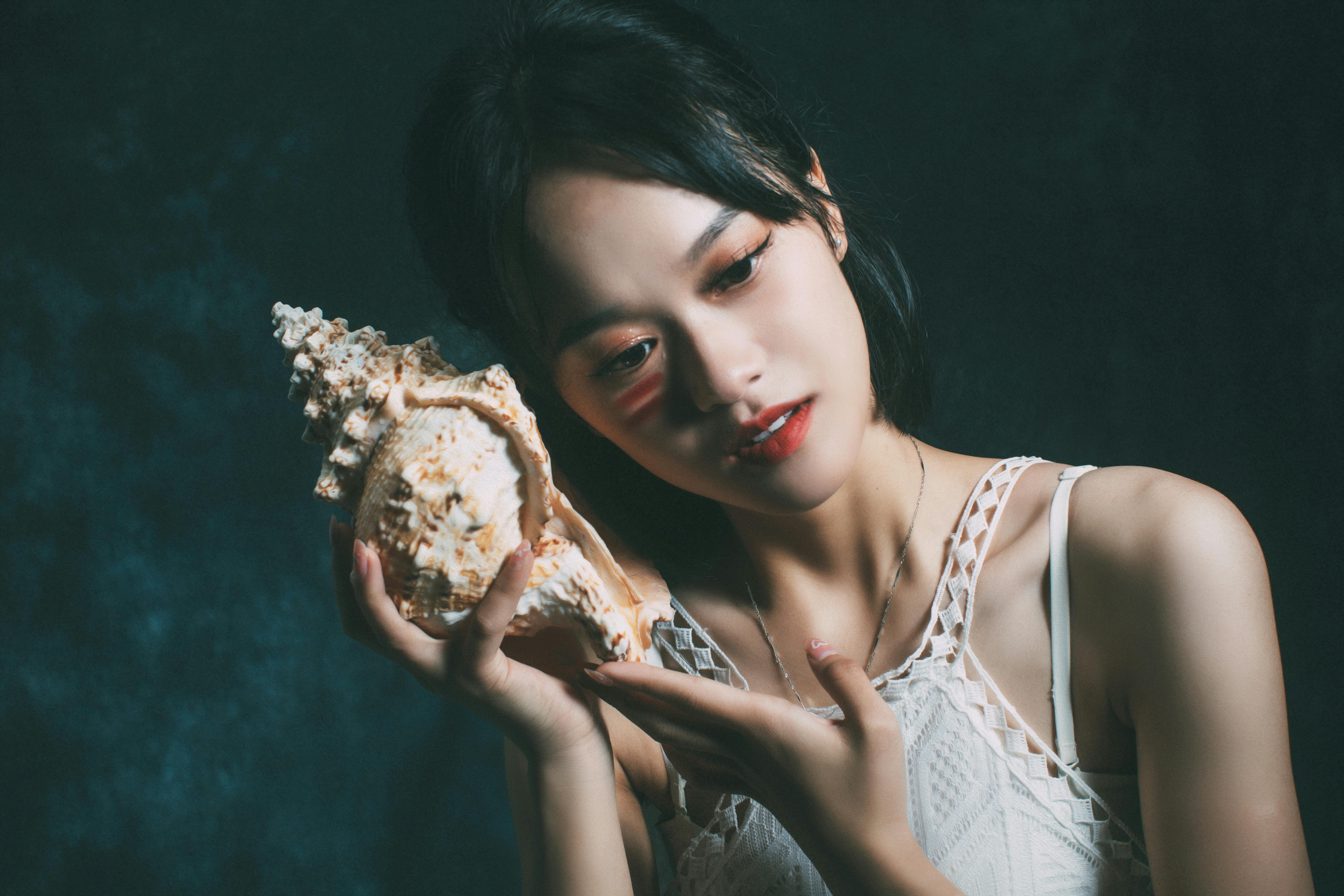 Portrait of Woman with Shell · Free Stock Photo