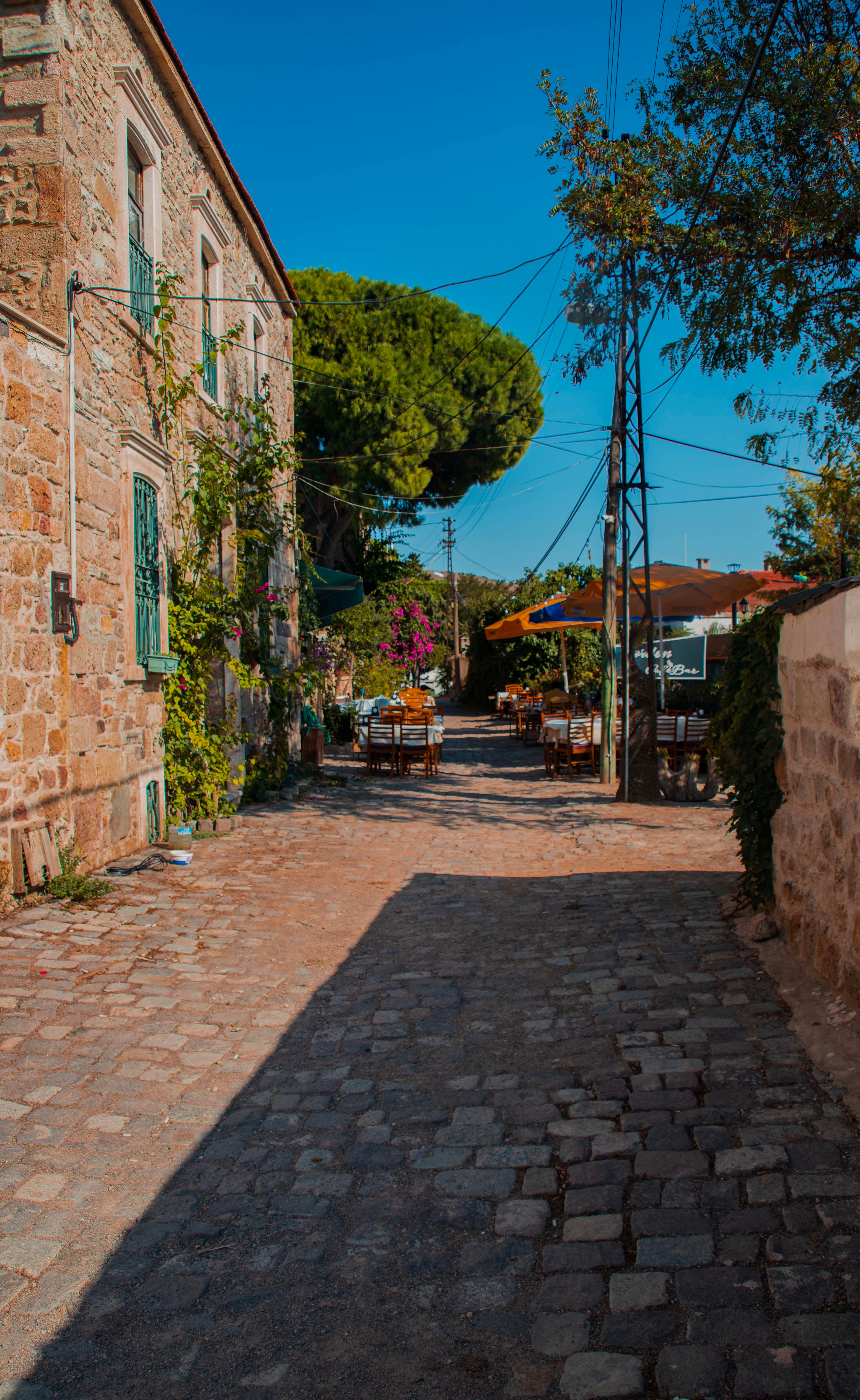 A Cobblestone Street and Stone Buildings in a Town · Free Stock Photo