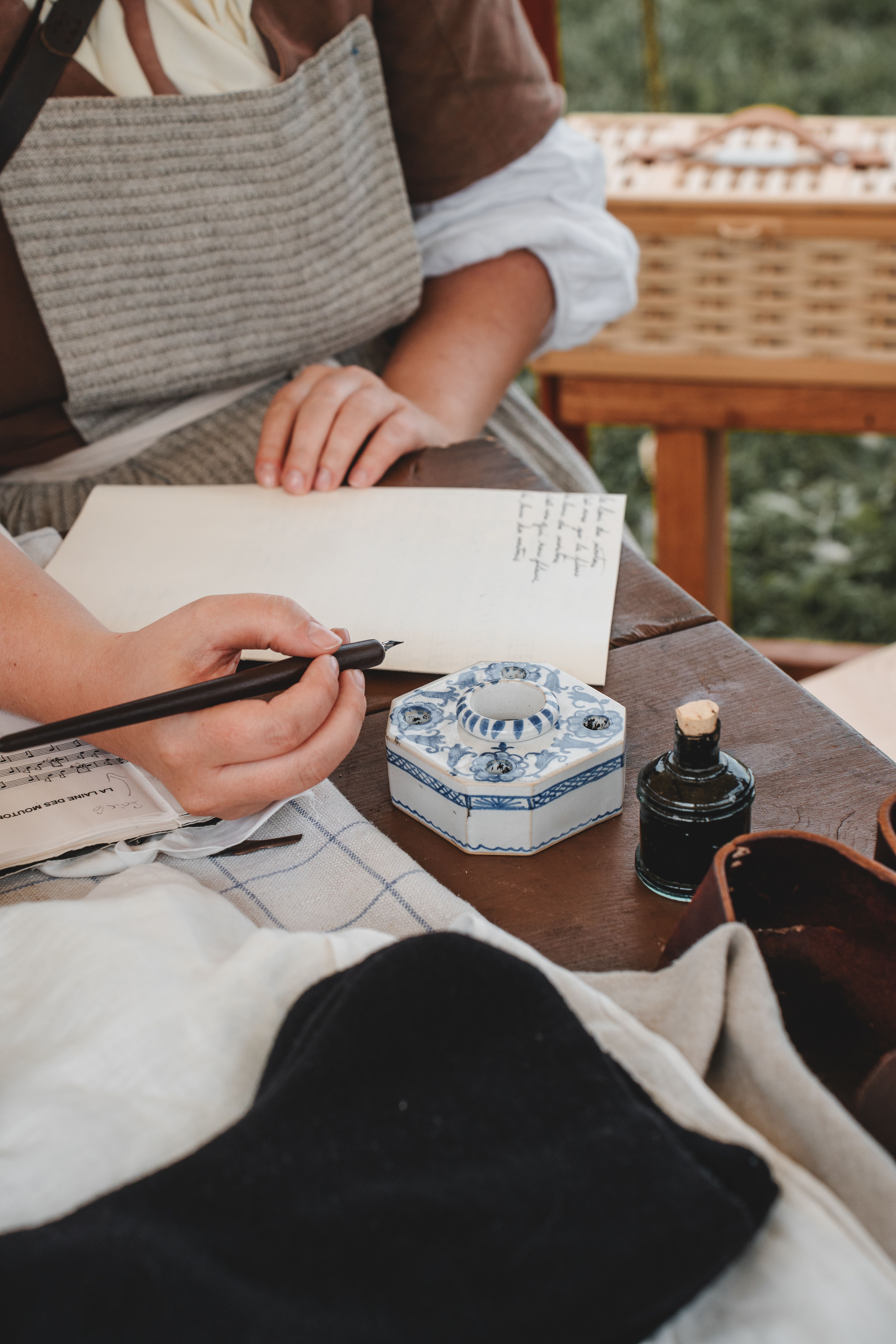 Woman Writing Letter on Table · Free Stock Photo