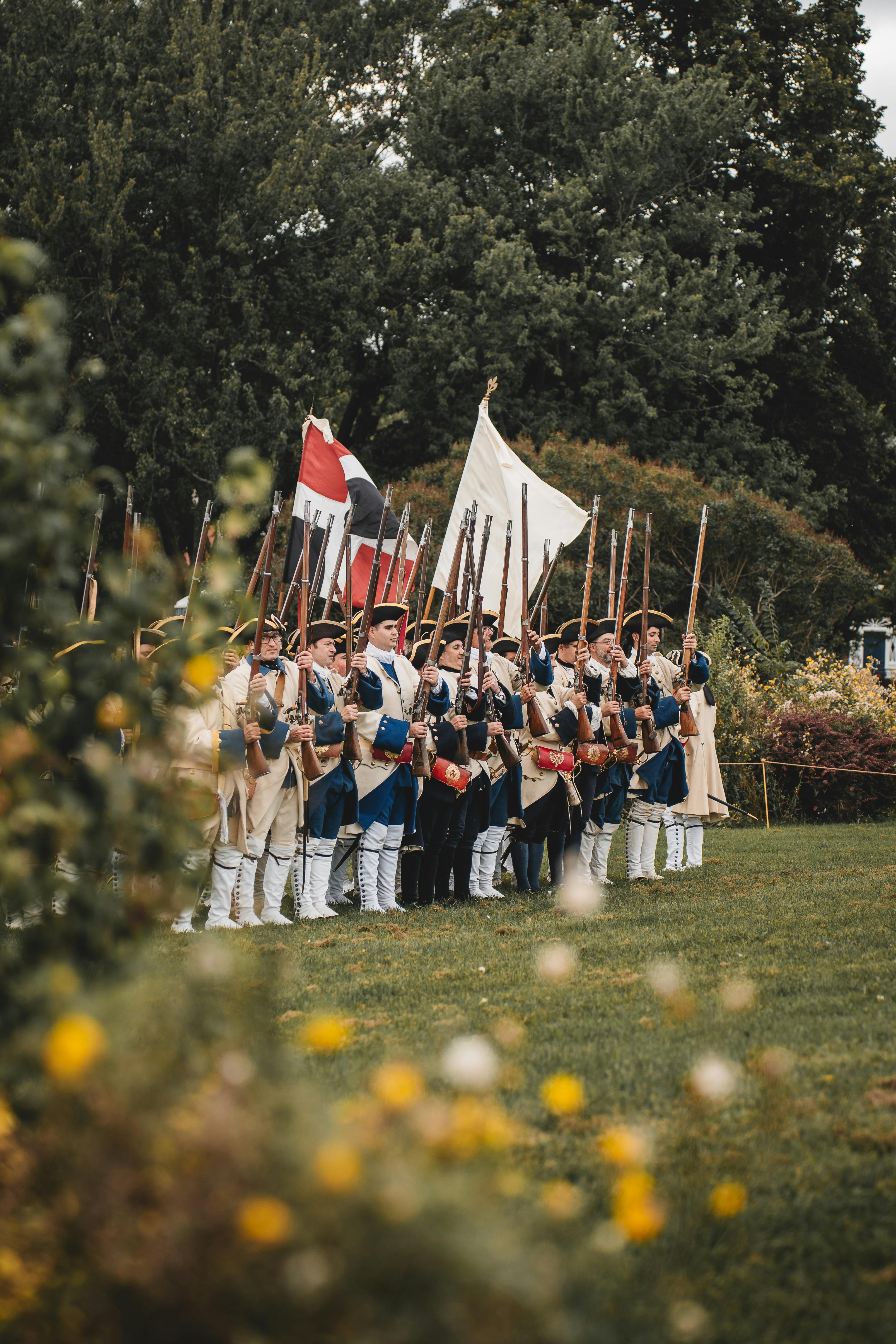 Traditional Army on a Meadow · Free Stock Photo