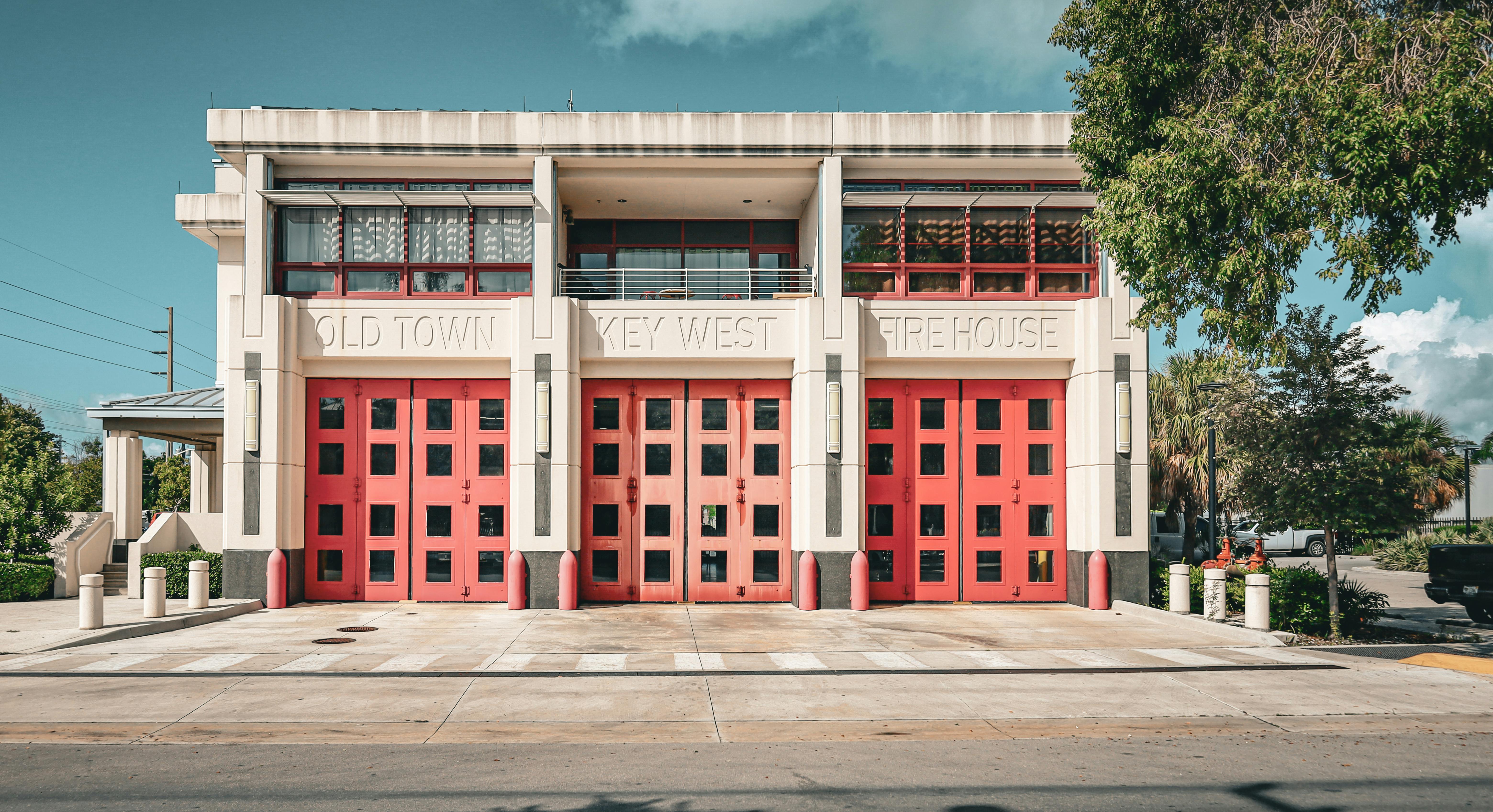 Facade of a Firehouse with Red Doors · Free Stock Photo