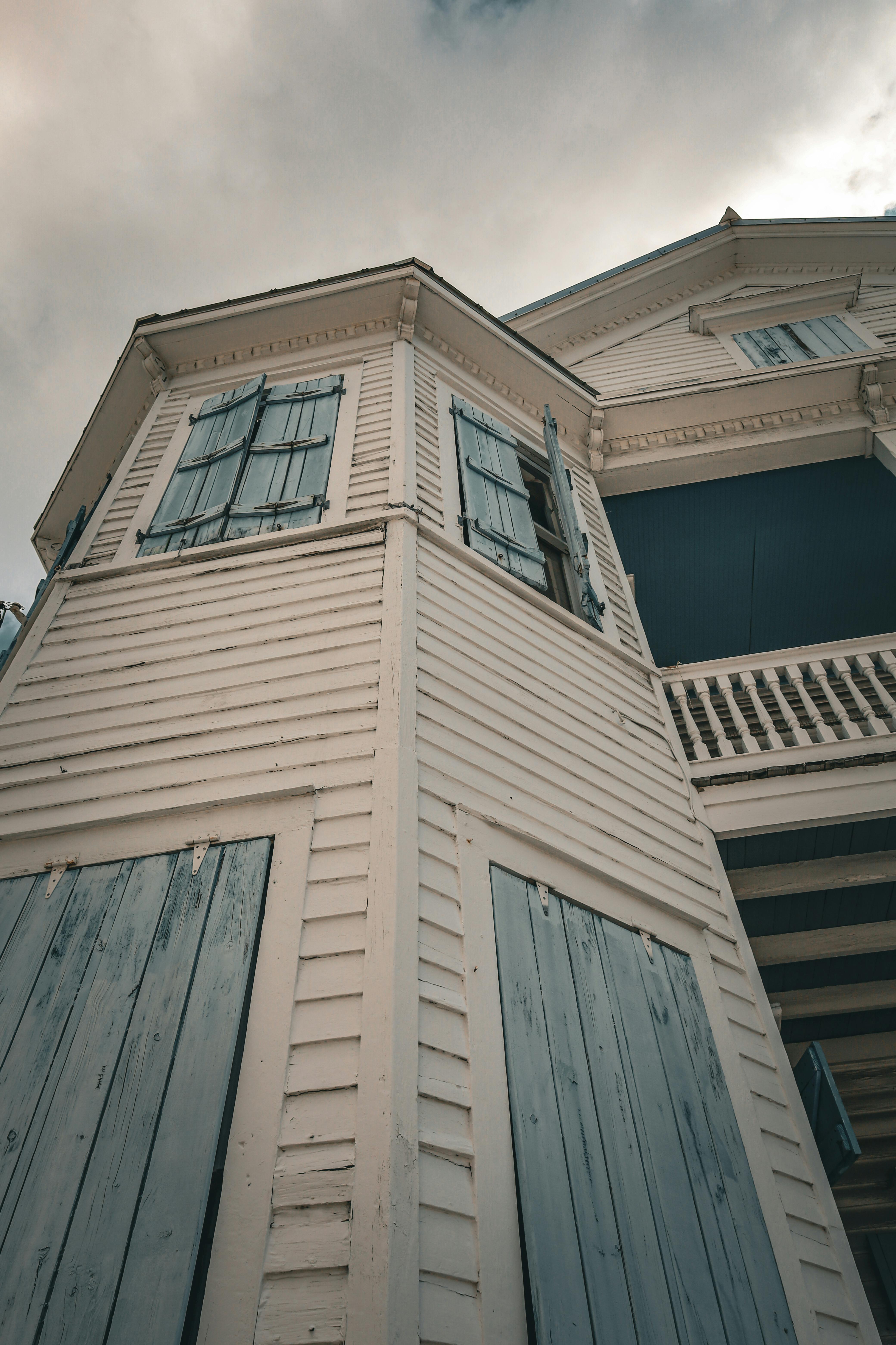 Antique Wooden Items Outside of a House · Free Stock Photo