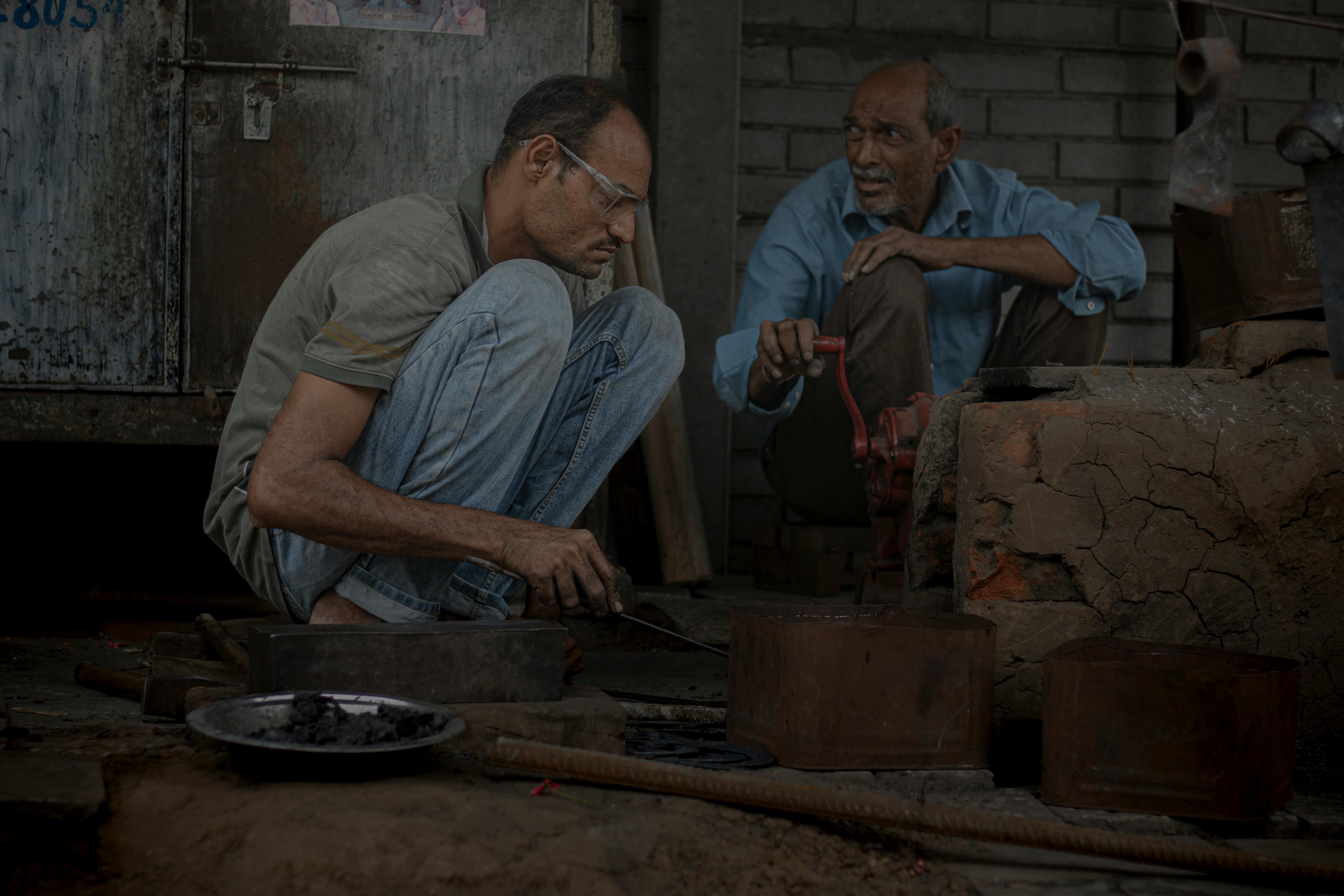 Blacksmiths at work · Free Stock Photo
