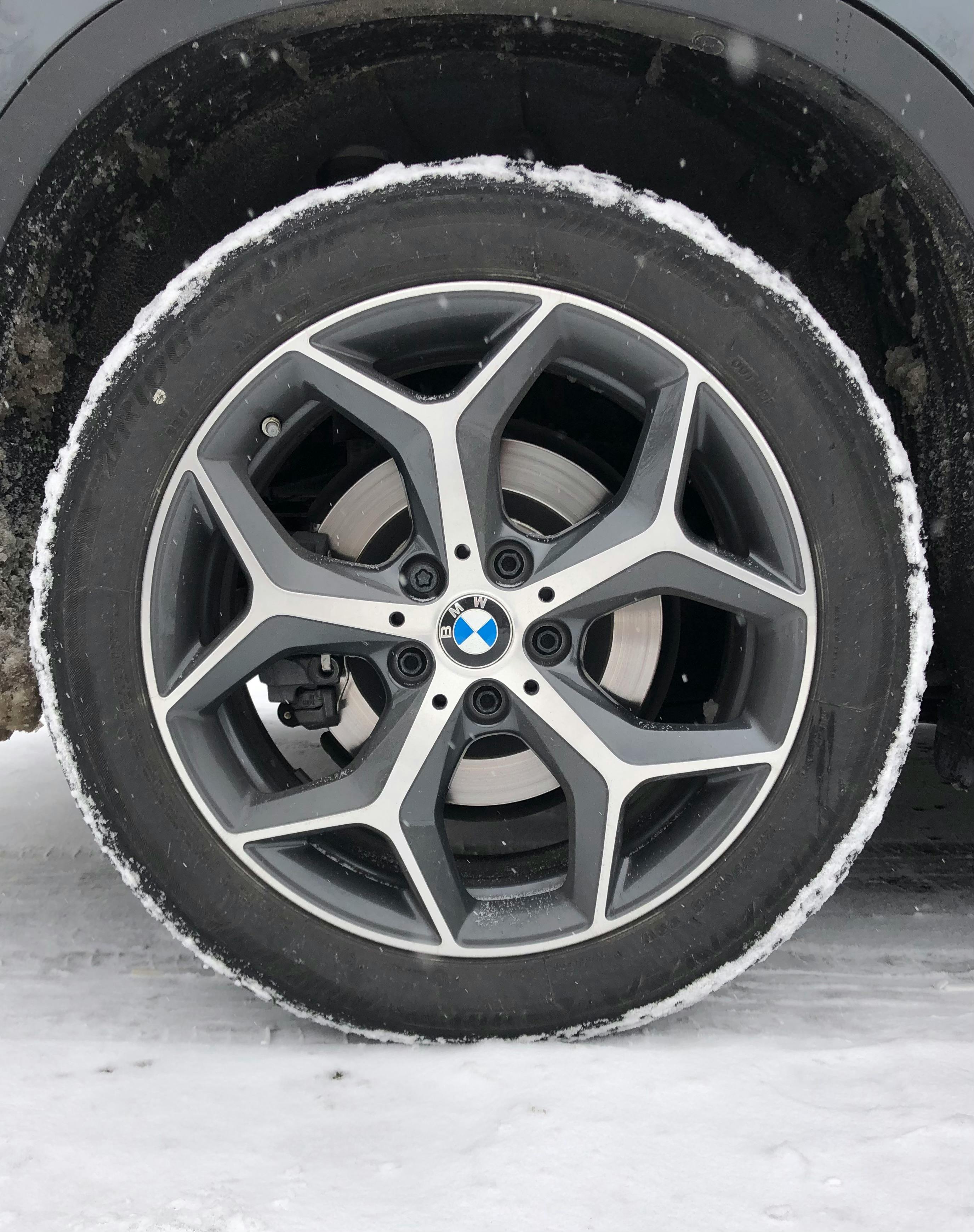 BMW Car Wheel in Snow · Free Stock Photo