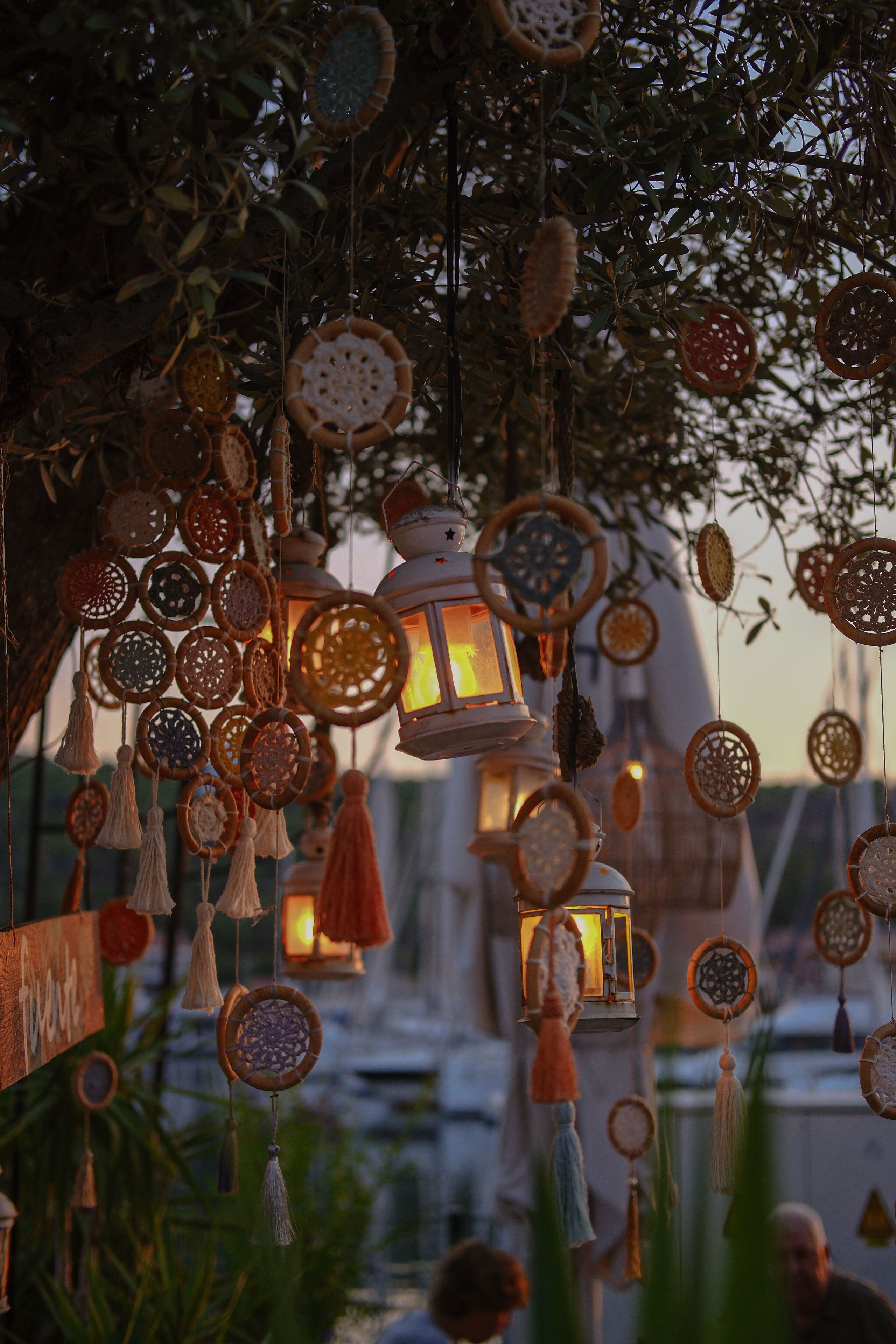 A hanging lantern with many different colored lights · Free Stock Photo