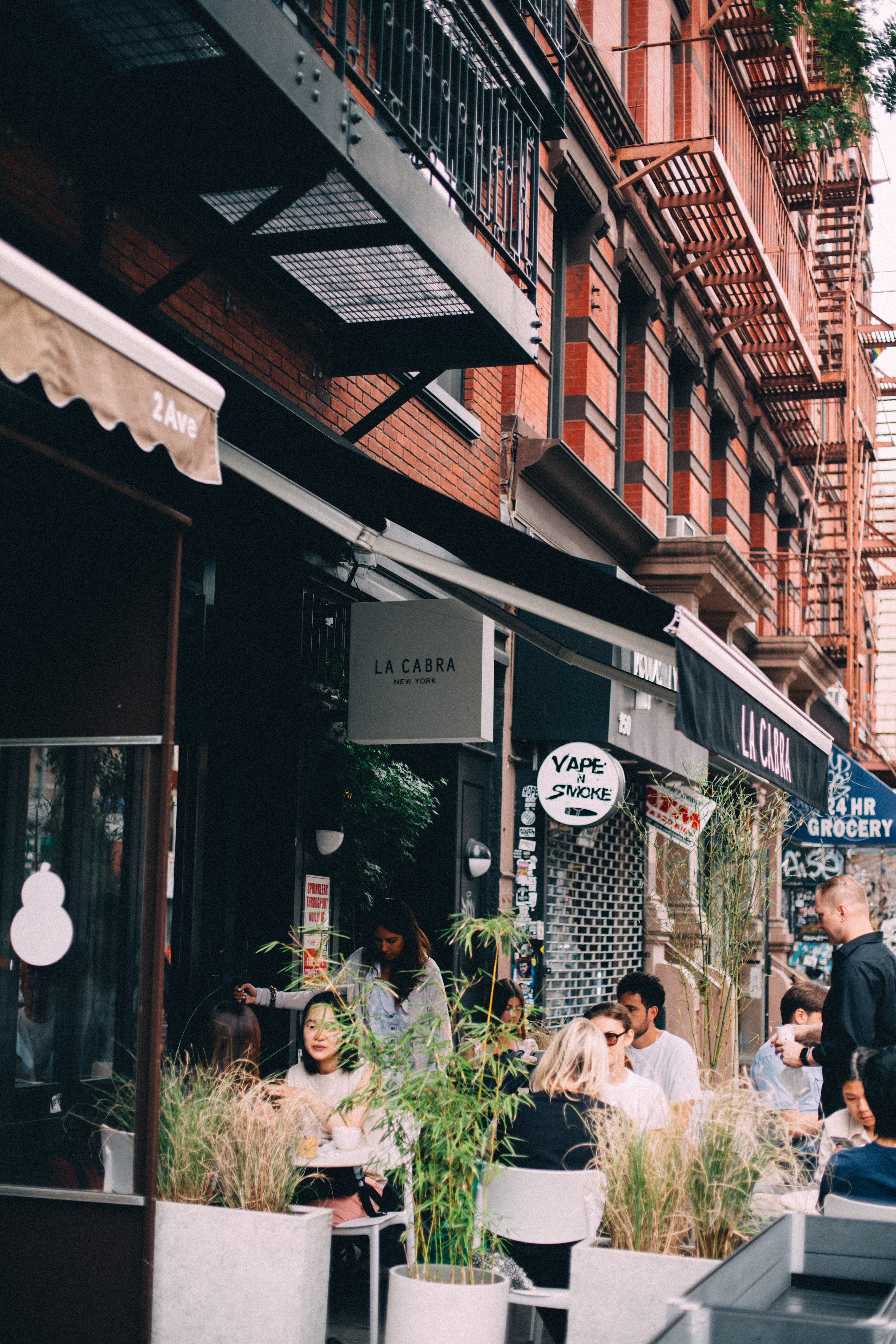 People Sitting at Cafe · Free Stock Photo