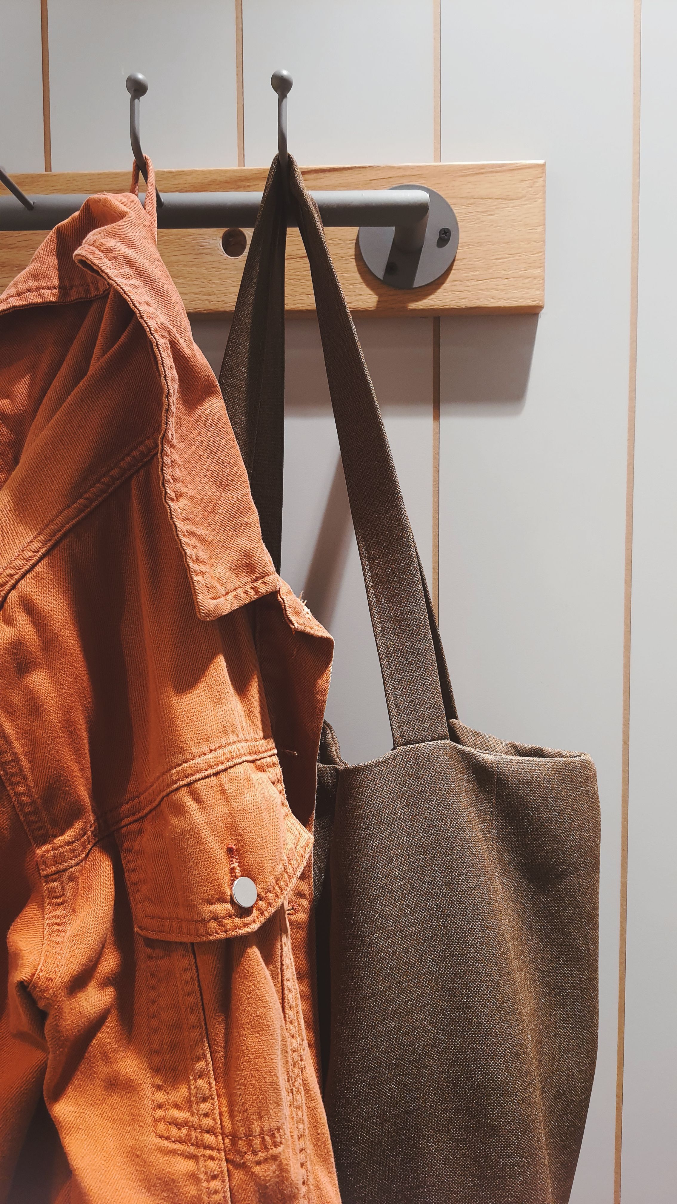 Jacket and Bag on Rack · Free Stock Photo