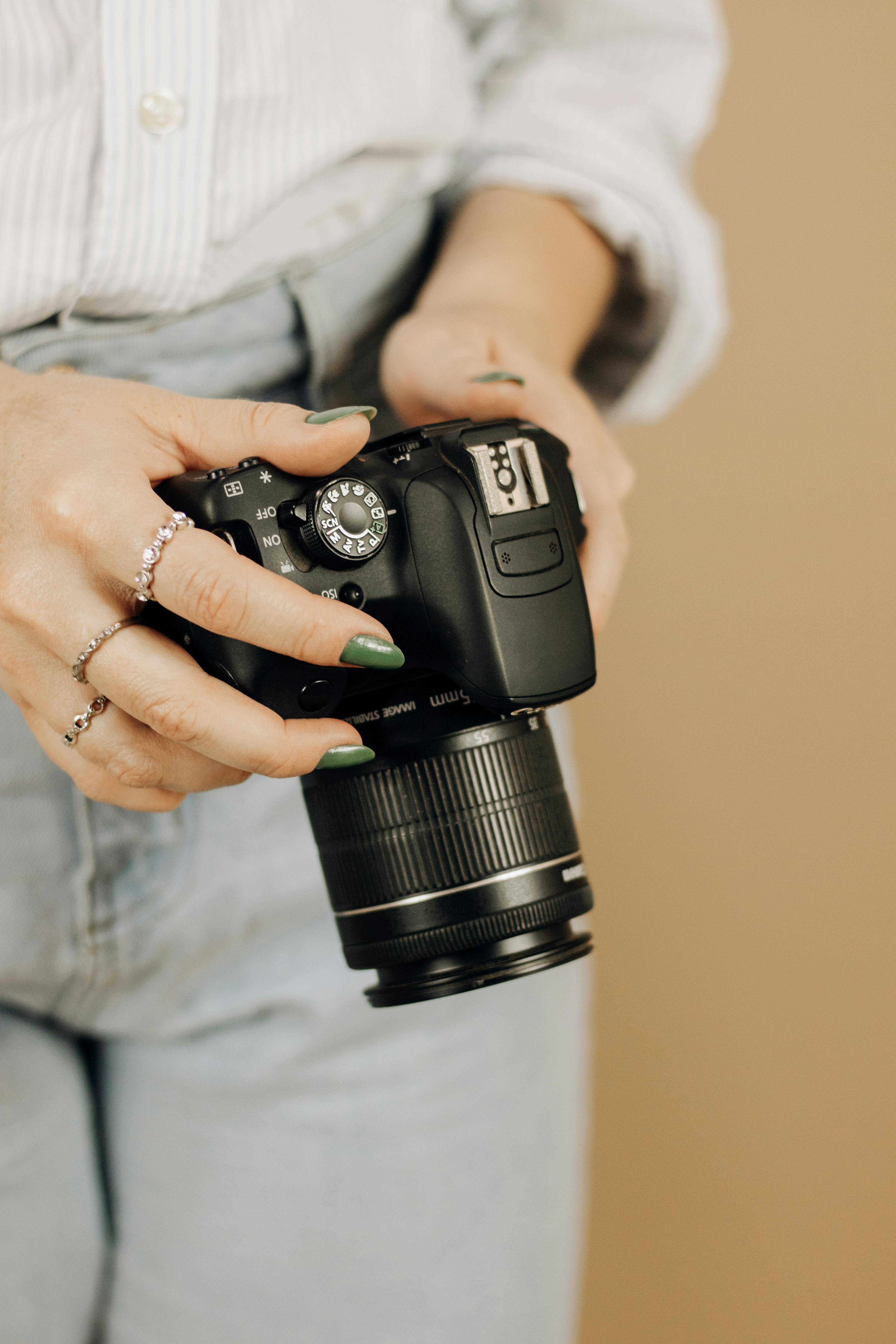 Woman Hands Holding Camera · Free Stock Photo