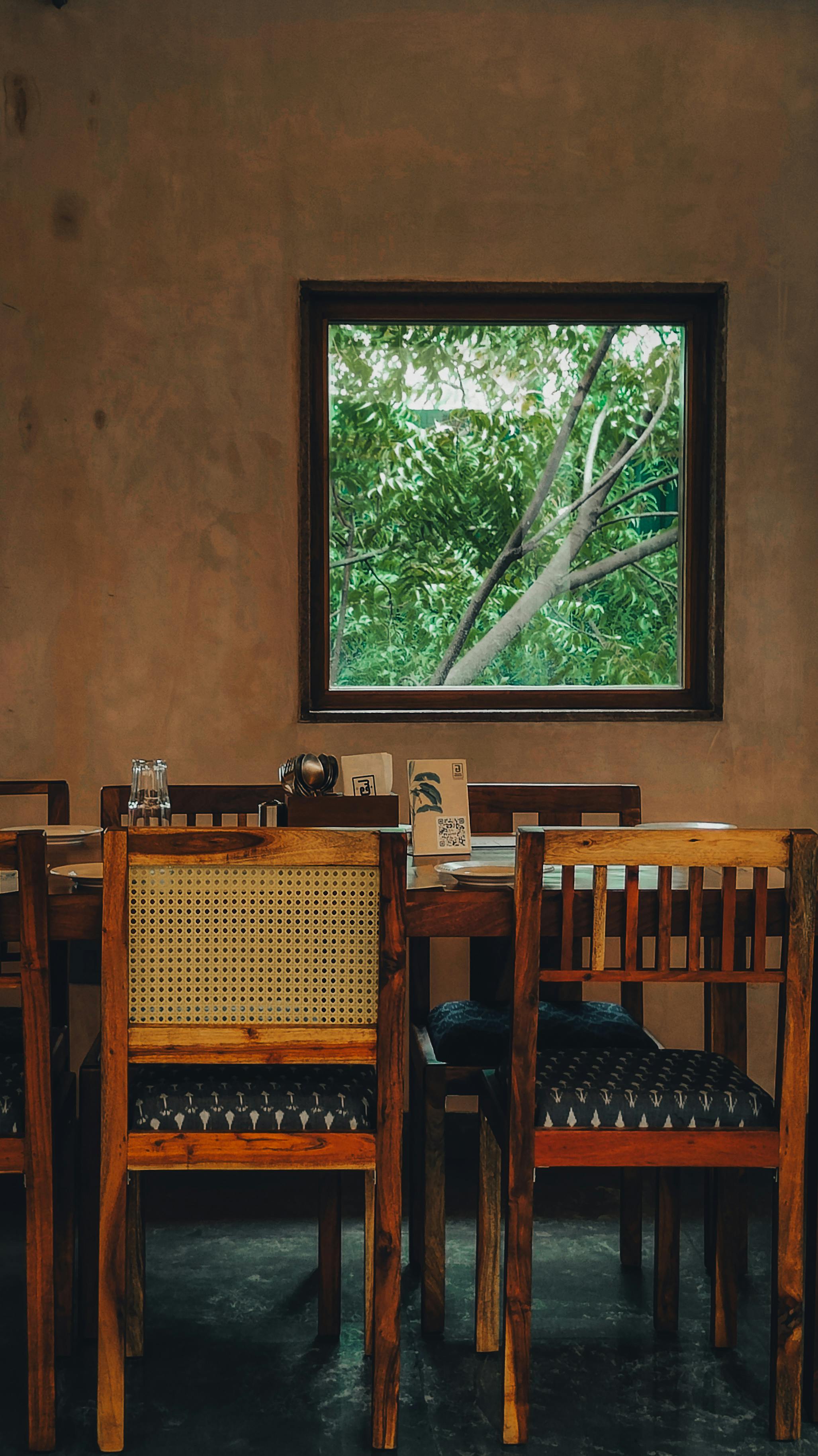 Restaurant Table by a Window · Free Stock Photo