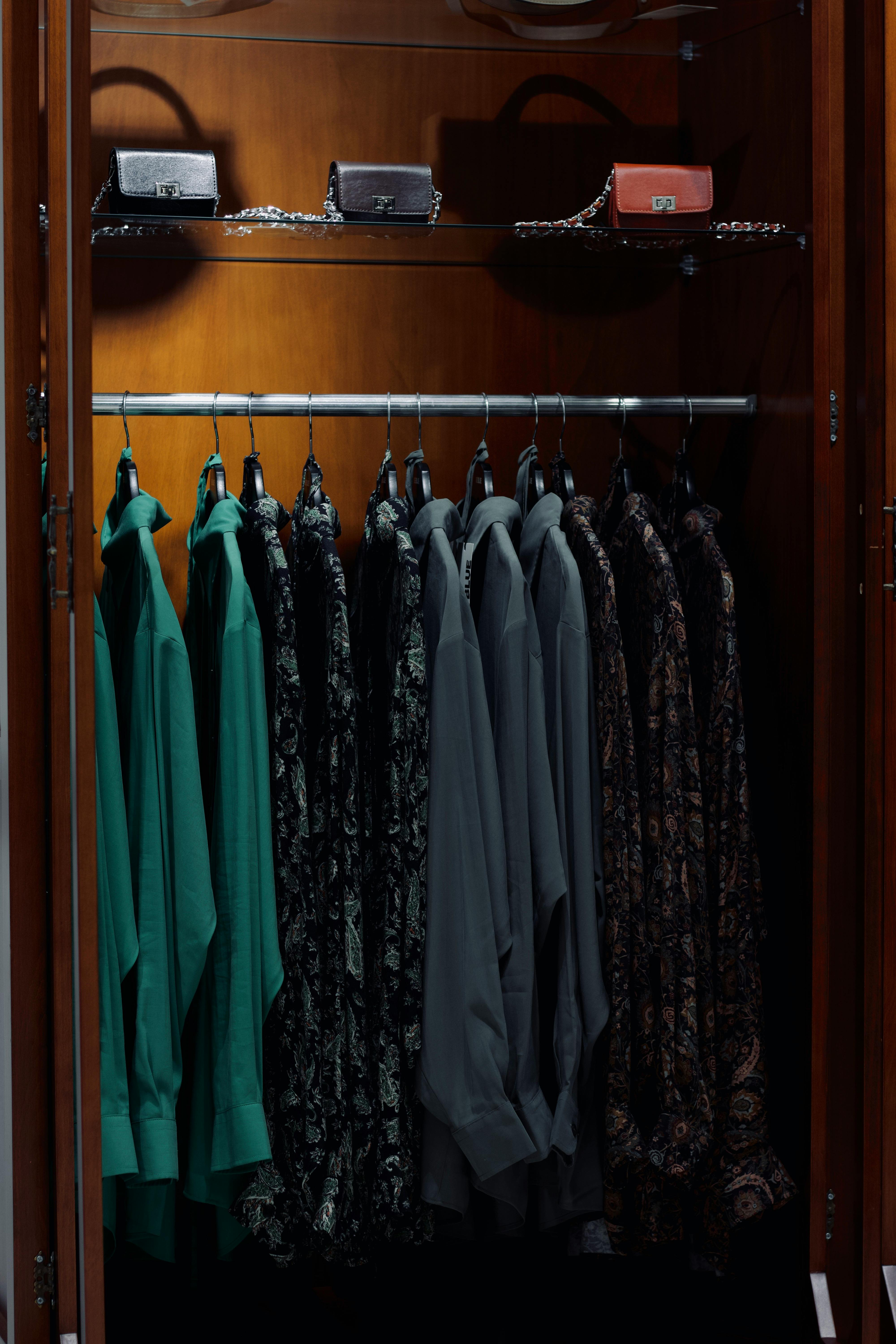 Photo of an Untidy and Messy White Wooden Closet · Free Stock Photo