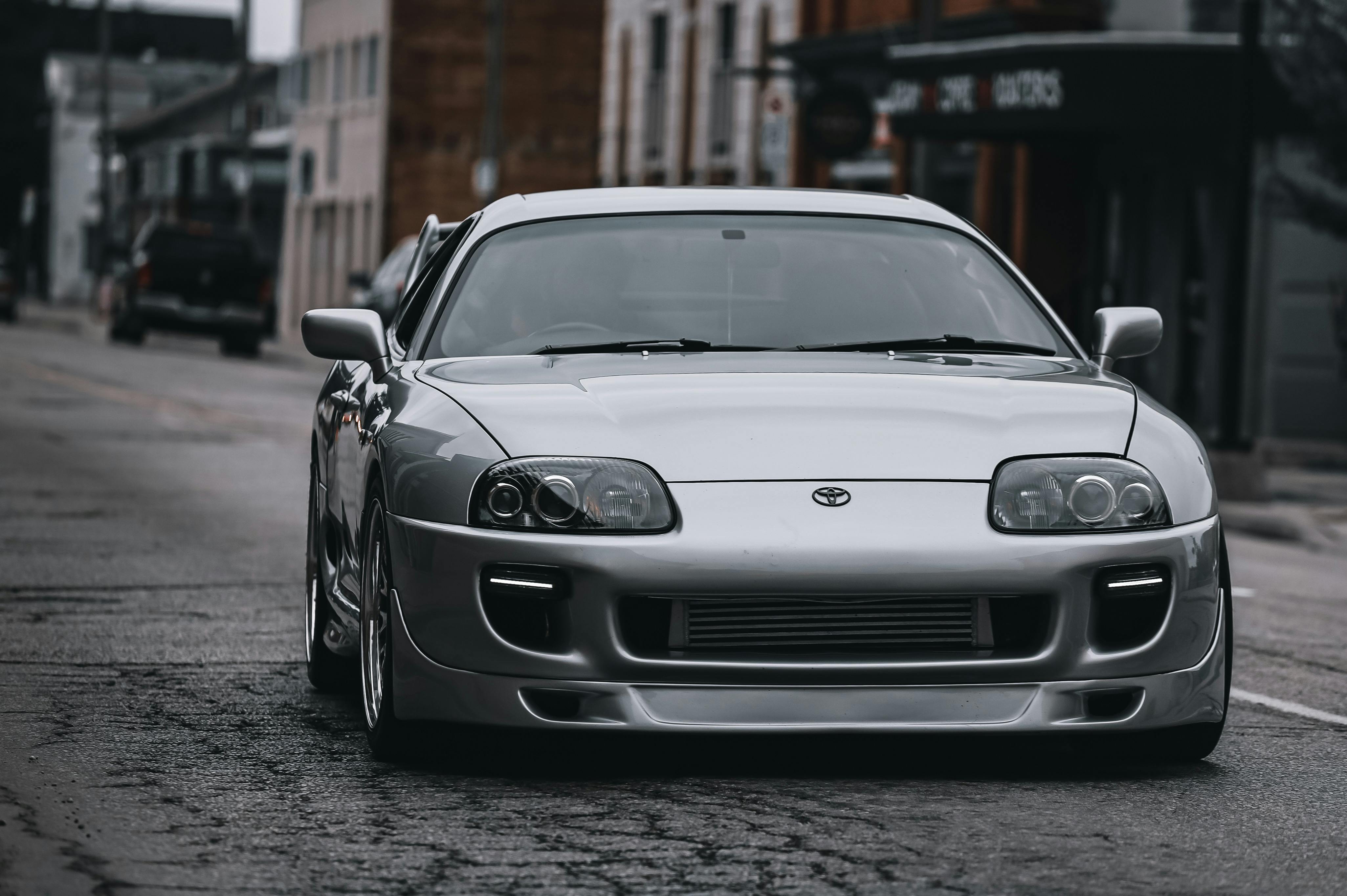 Silver Toyota Supra Running on Street · Free Stock Photo