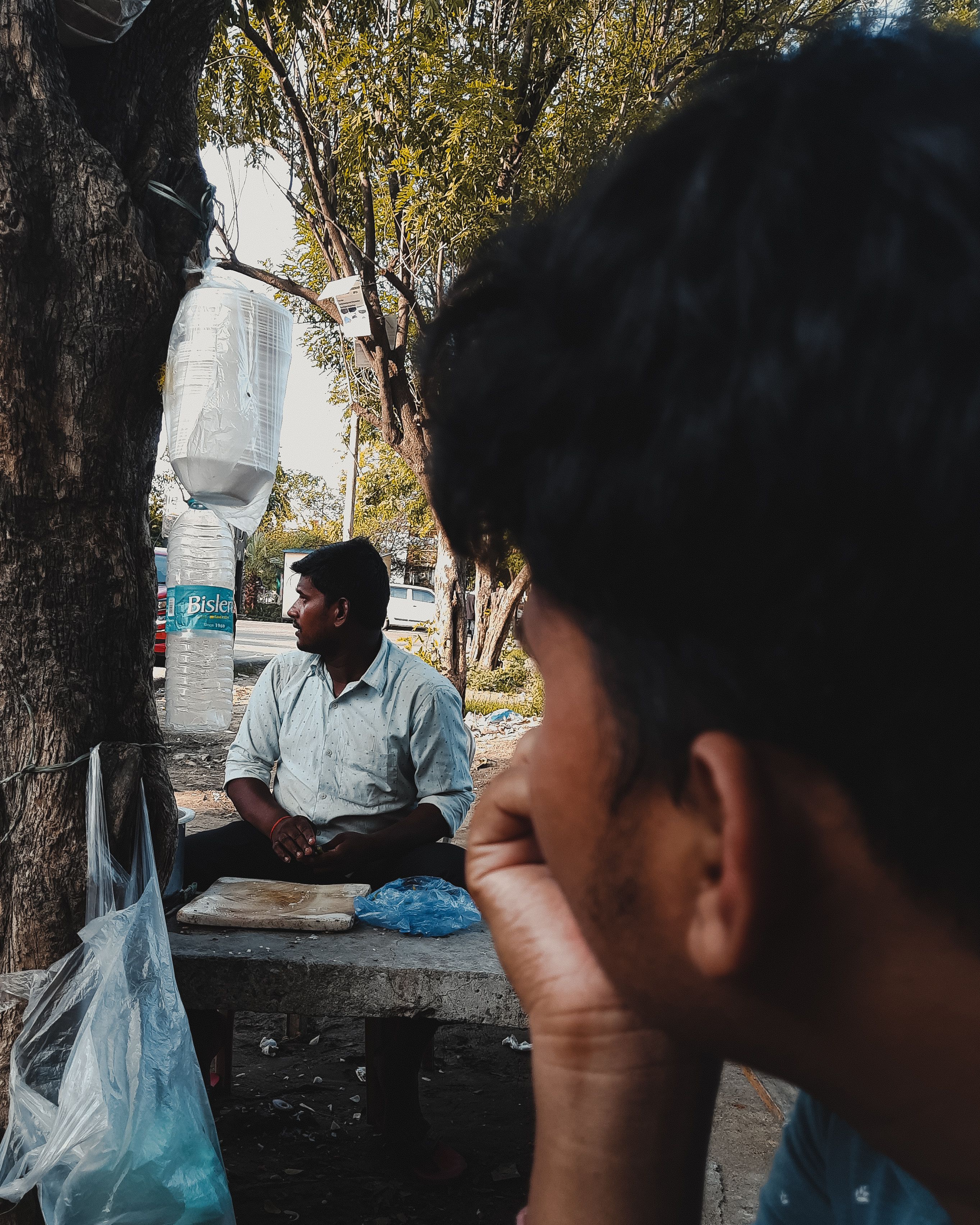 Back View of a Man Looking at Another Man · Free Stock Photo