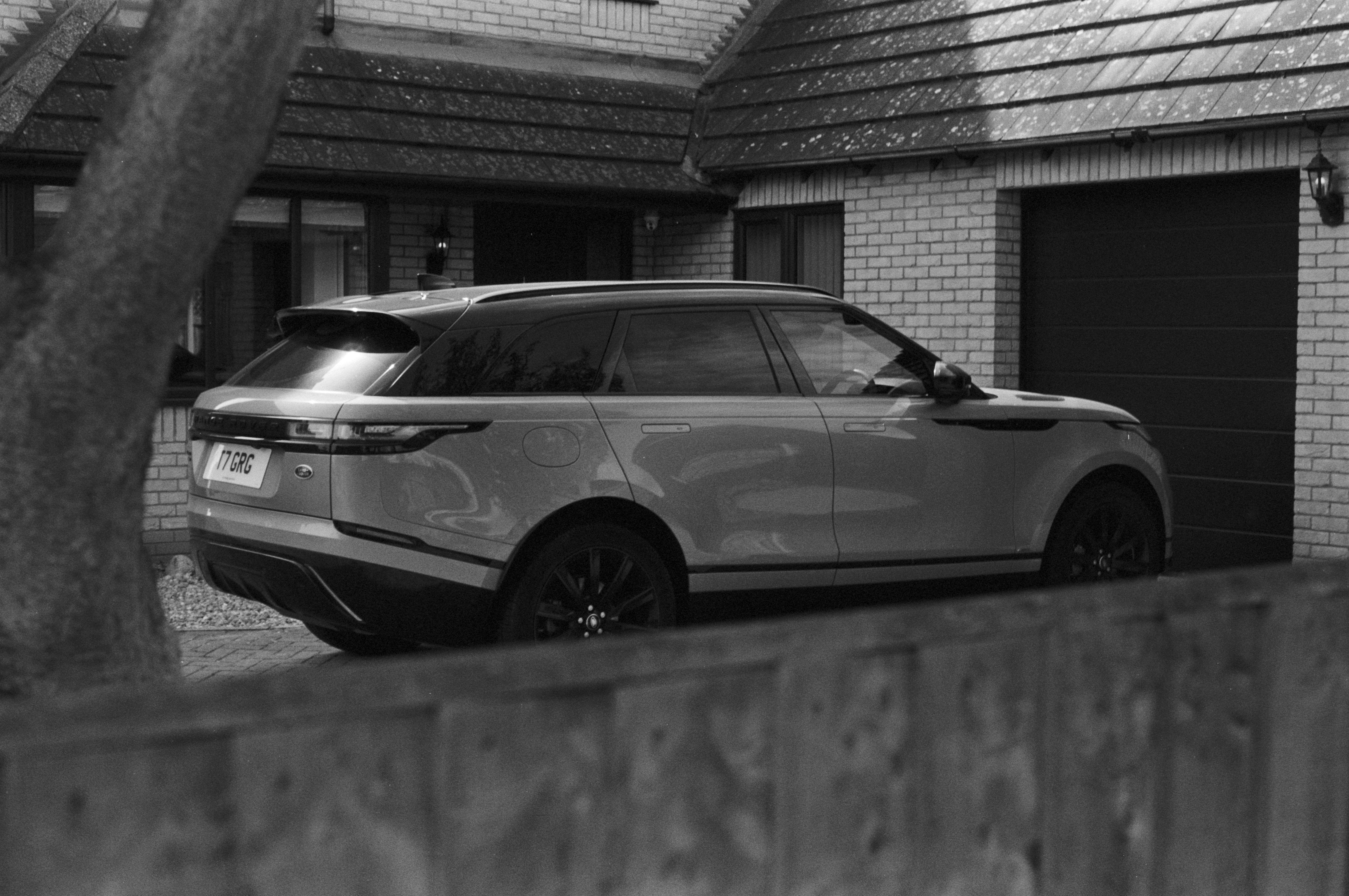Range Rover Velar in the Driveway of the House · Free Stock Photo