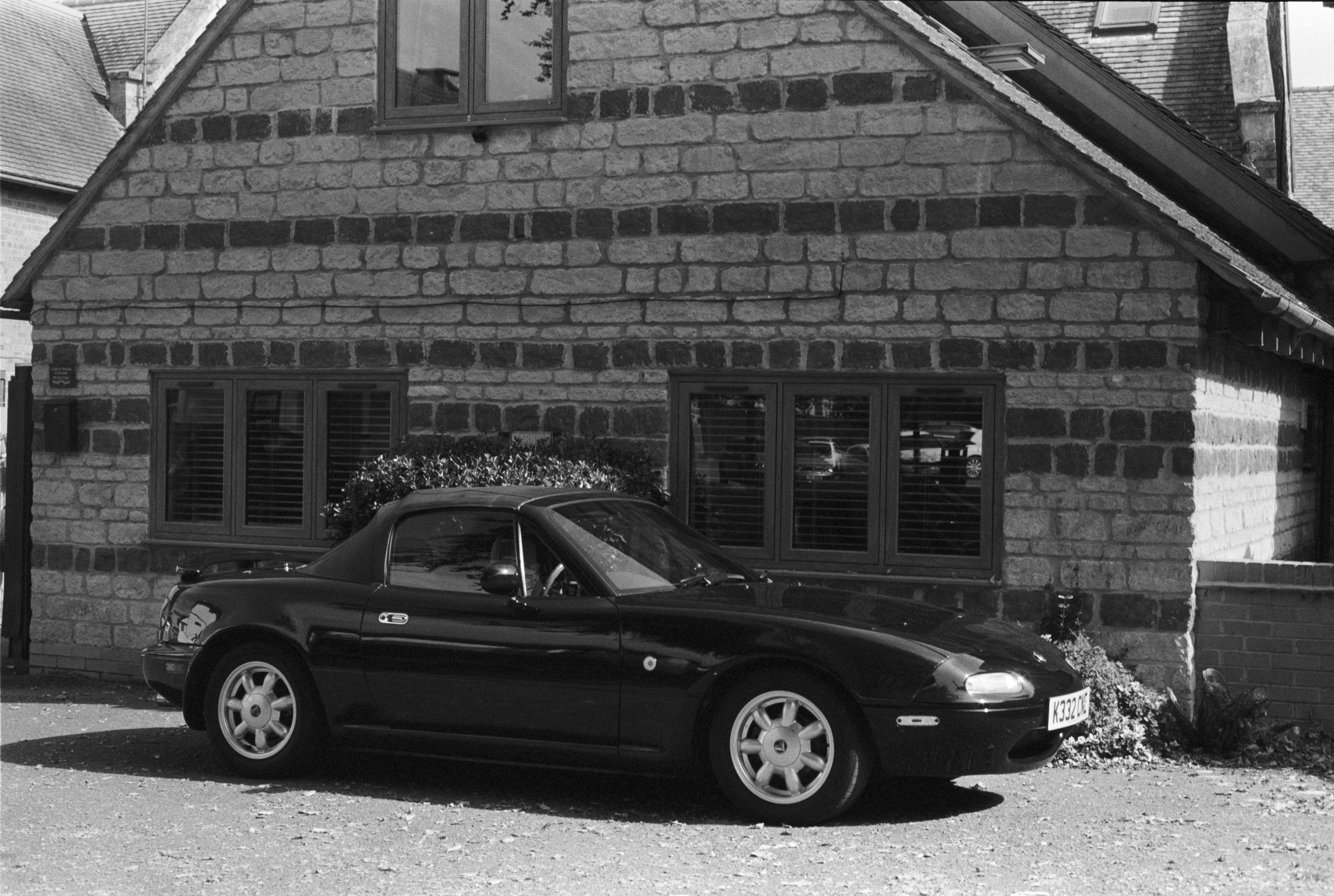 Second Generation Mazda Miata Parked in Front of the House · Free Stock ...