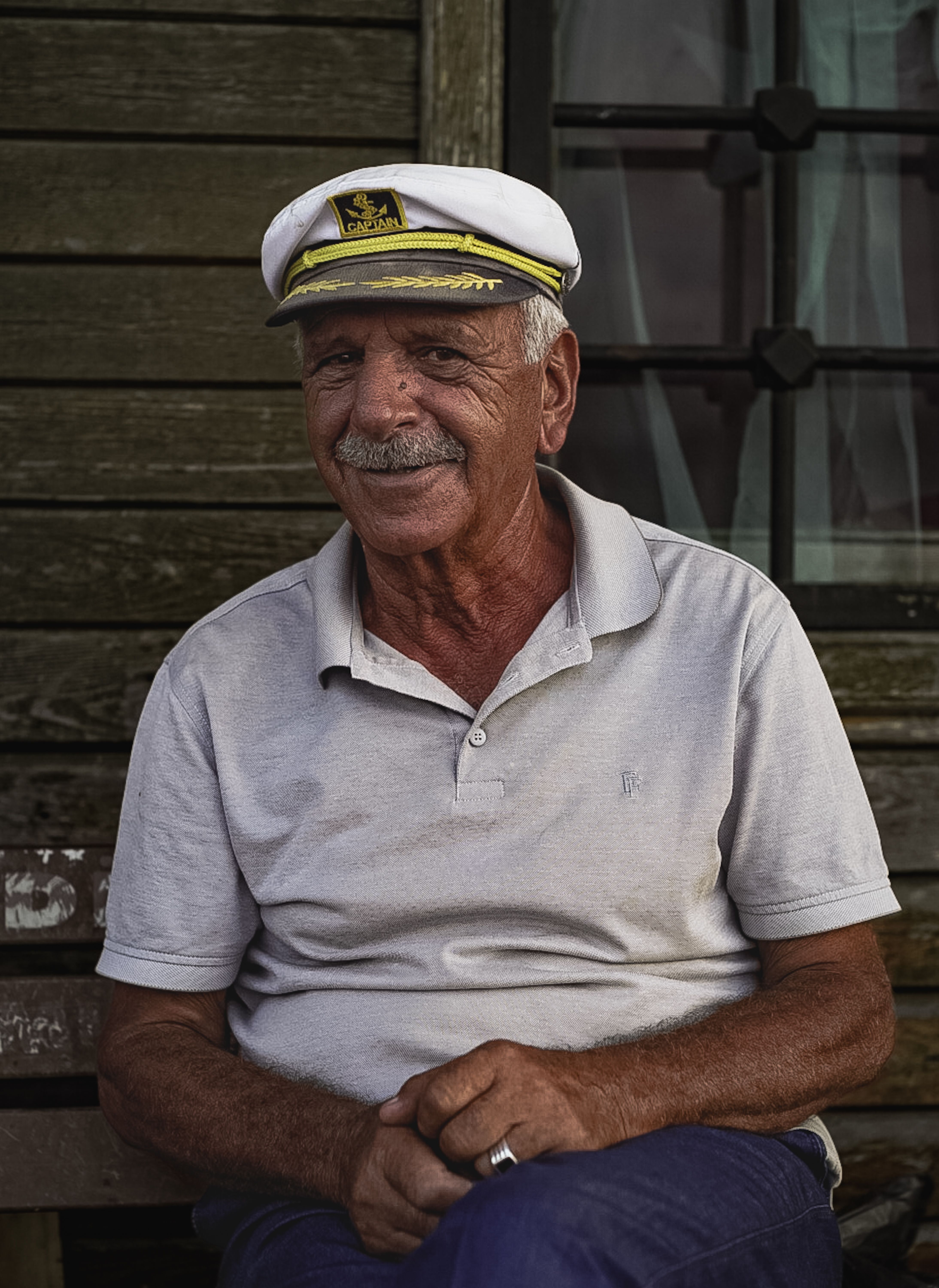 Smiling Man in Captain Hat · Free Stock Photo