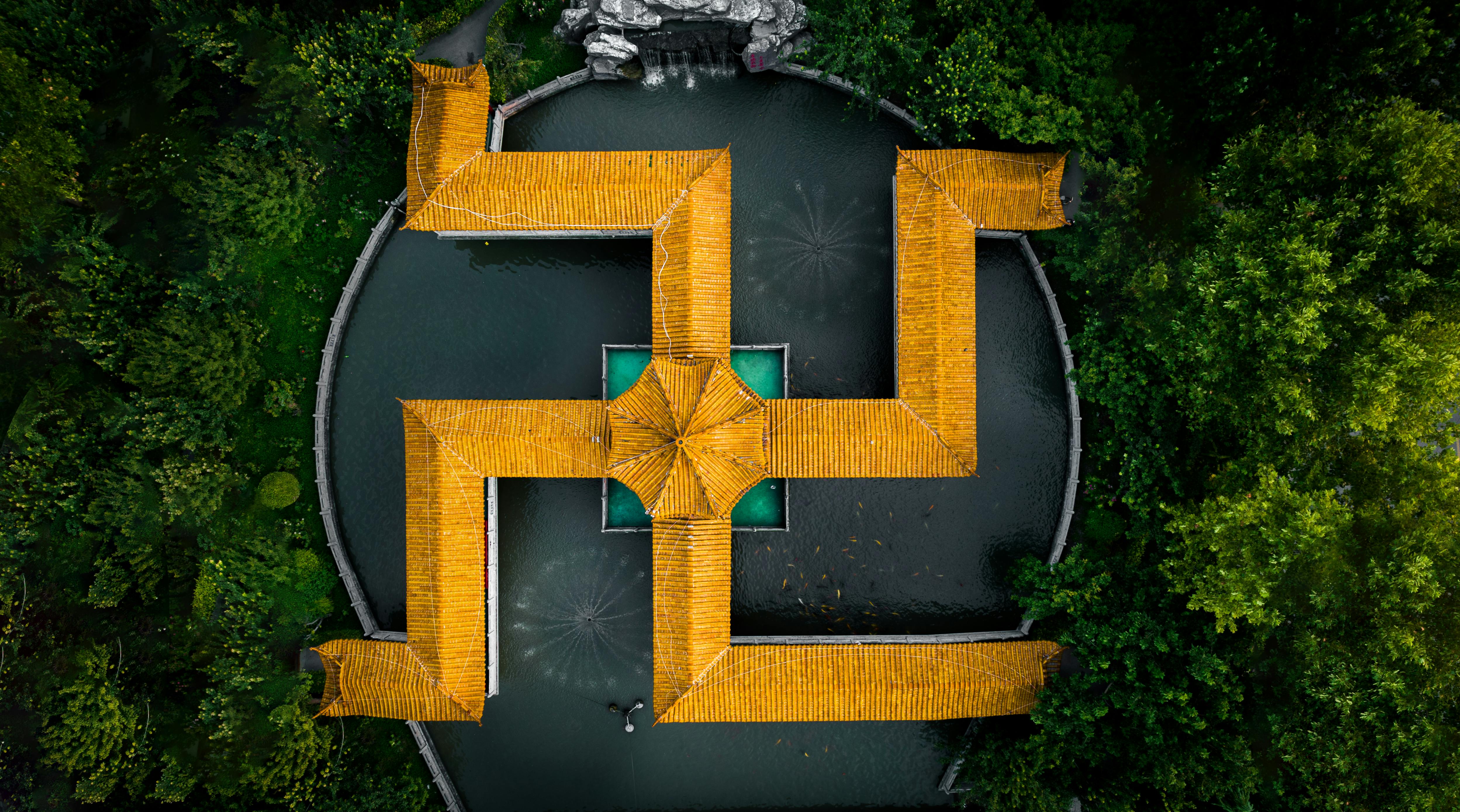 Aerial View of a Gazebo on a Pond with Boardwalks in the Shape of a ...