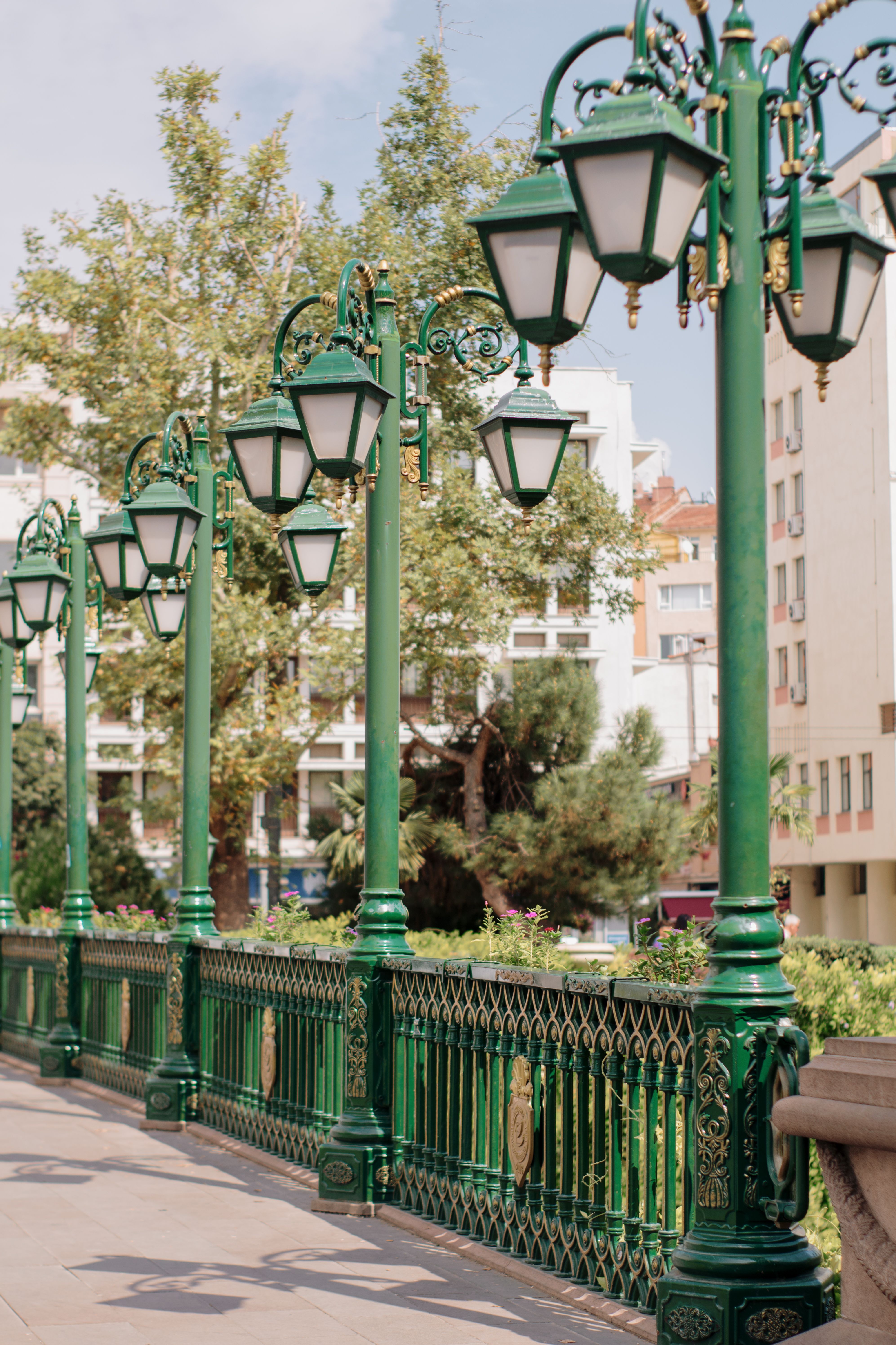 Green Street Lamps by Pavement in City · Free Stock Photo