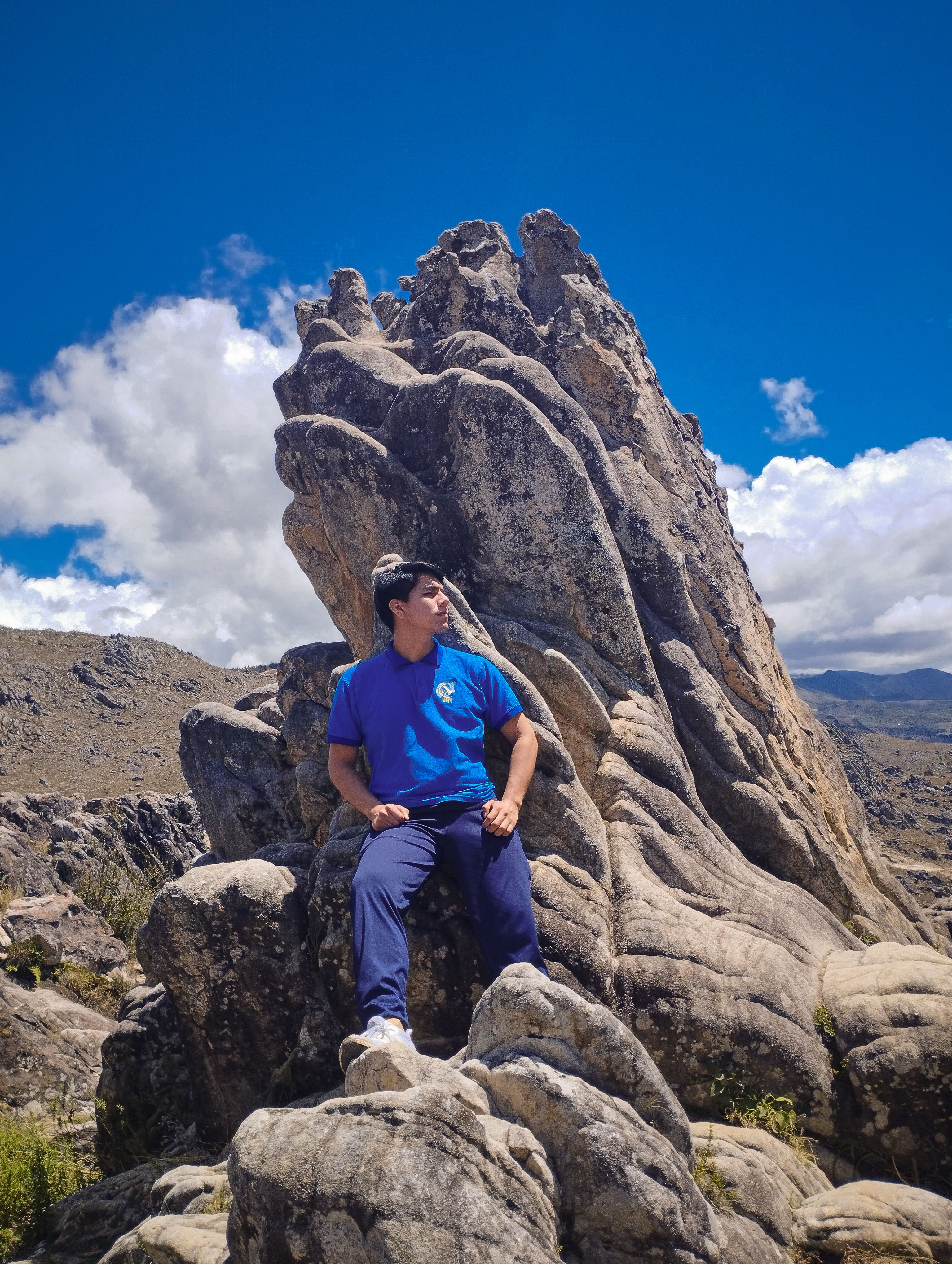 Man Posing by Rocks · Free Stock Photo