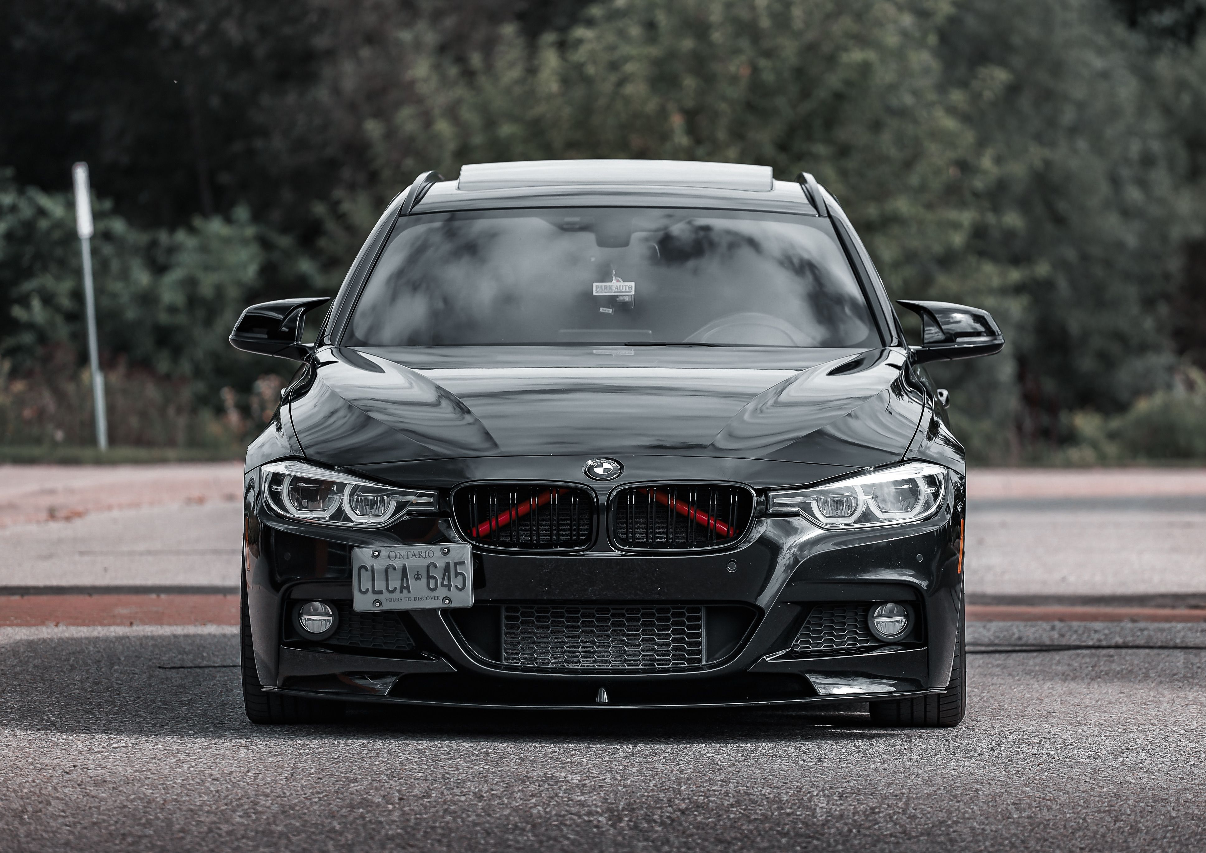 BMW Letters on Asphalt · Free Stock Photo