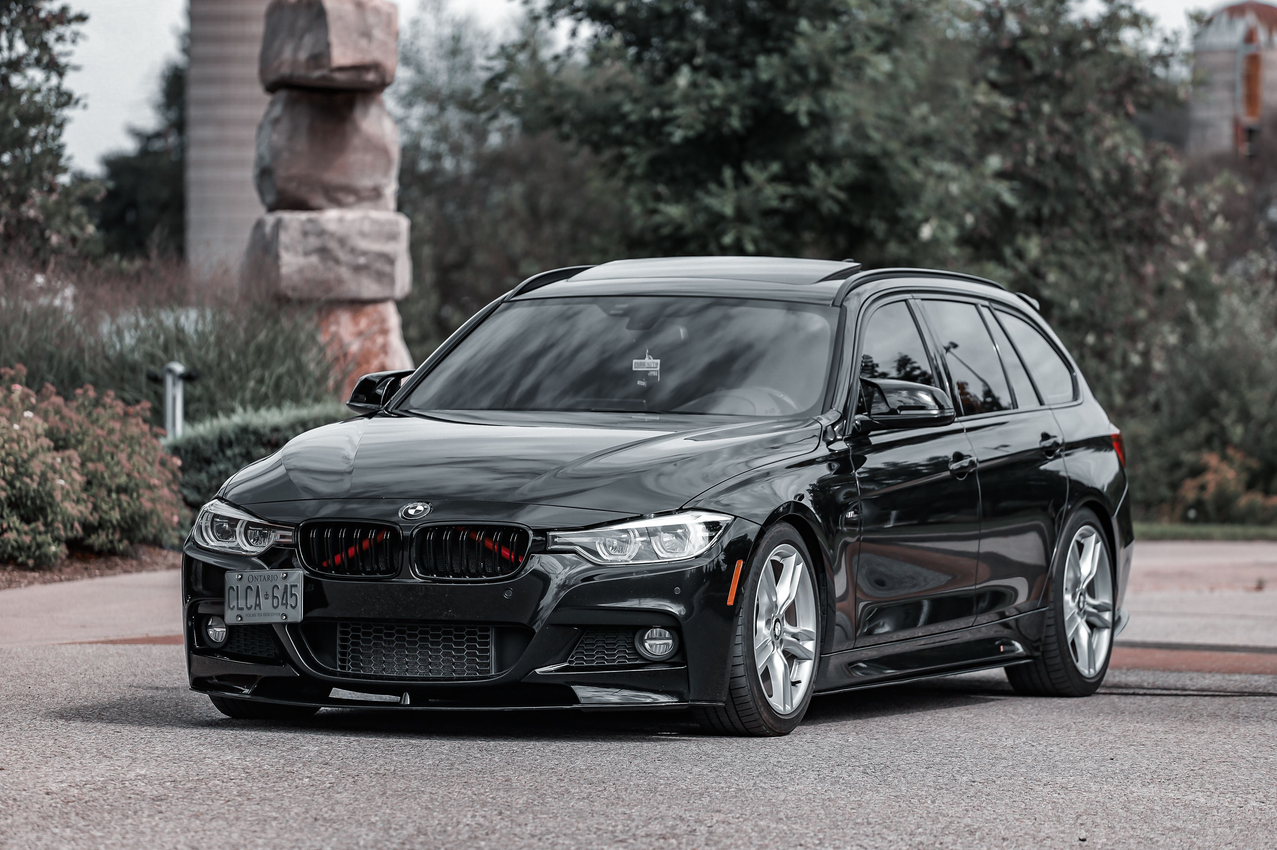 BMW Letters on Asphalt · Free Stock Photo