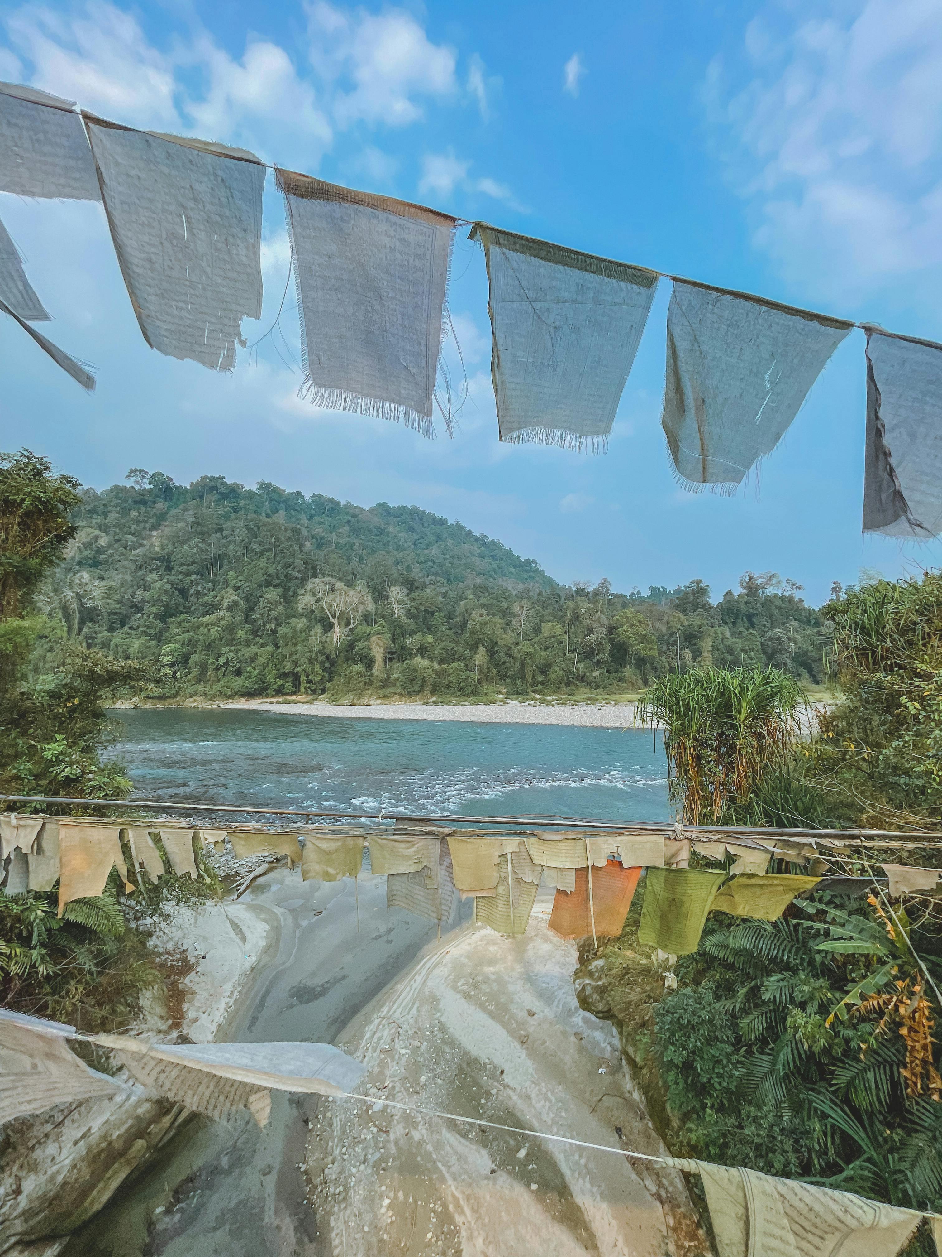 Fabrics Hanging over River · Free Stock Photo