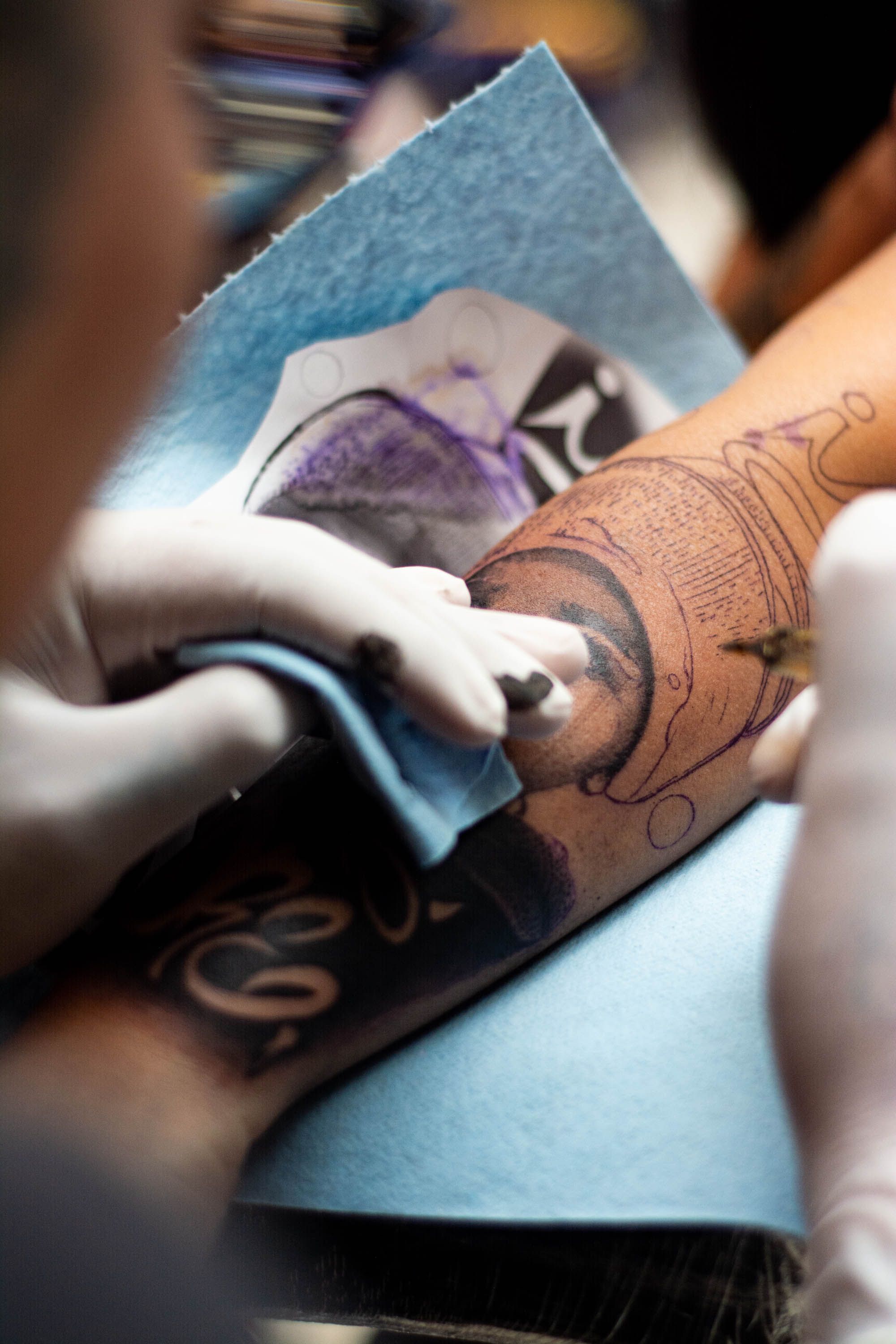 Artist Tattooing Arm · Free Stock Photo