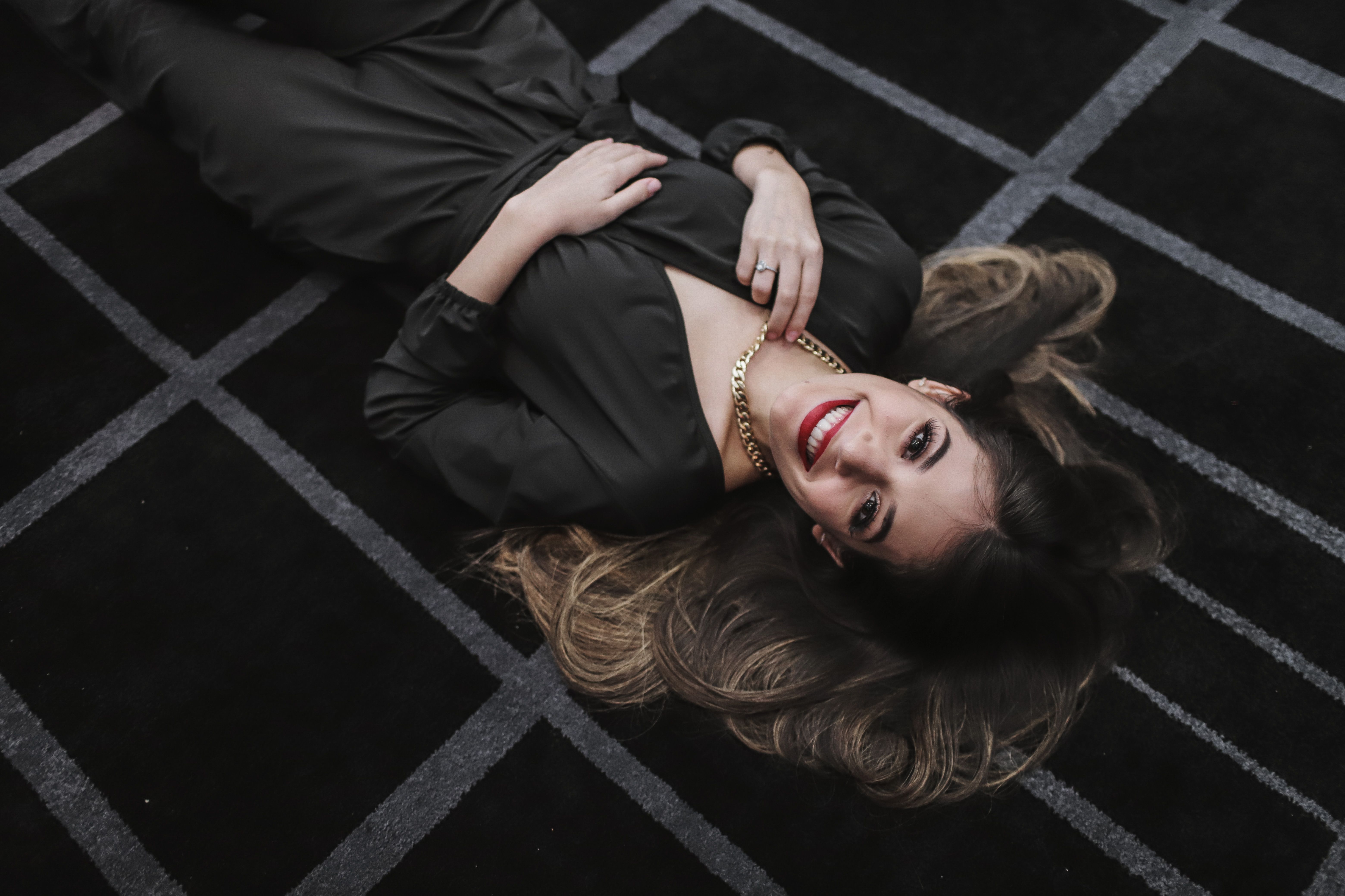 Woman Lying on Floor · Free Stock Photo