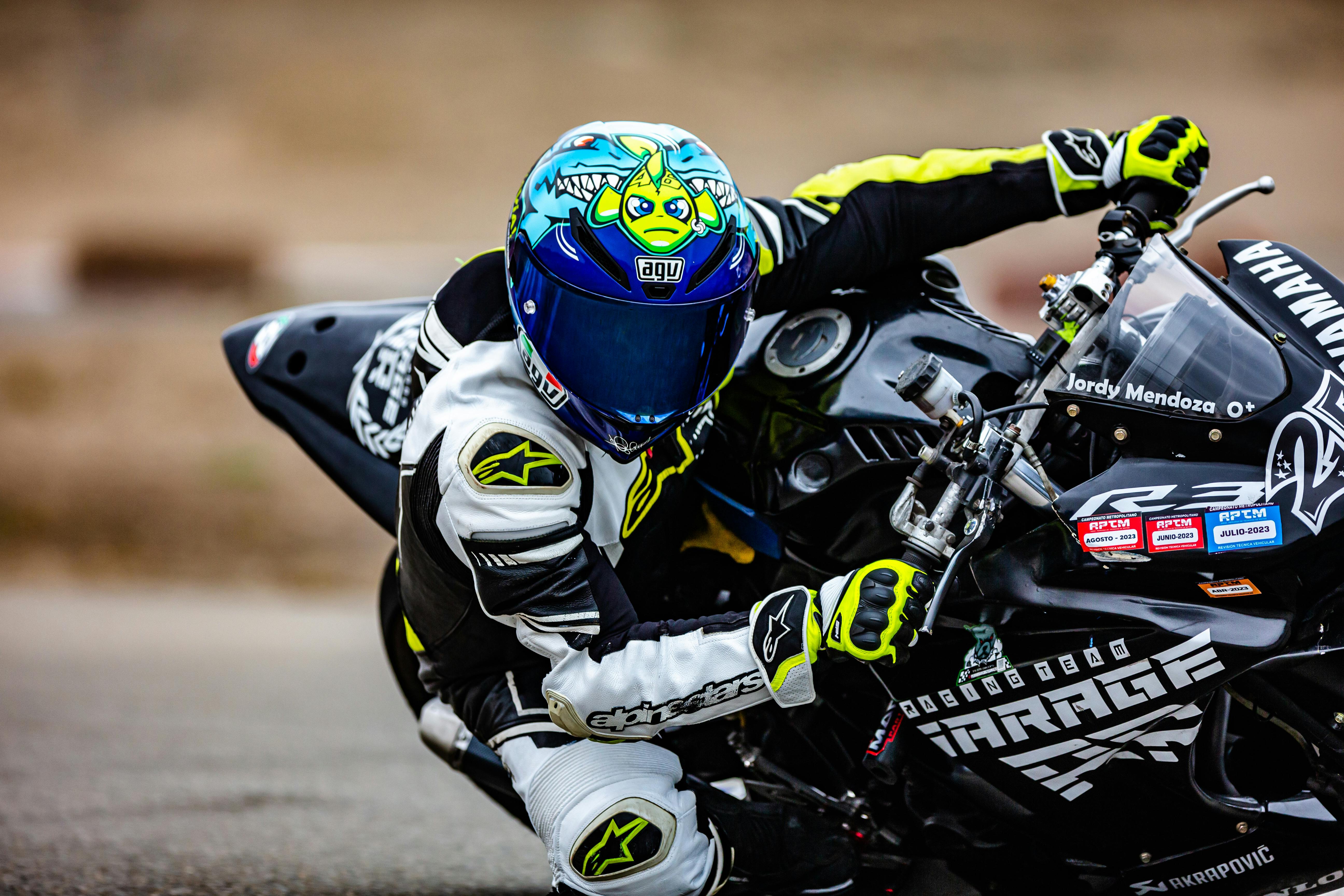 Motorcycle Racer on the Race Track · Free Stock Photo