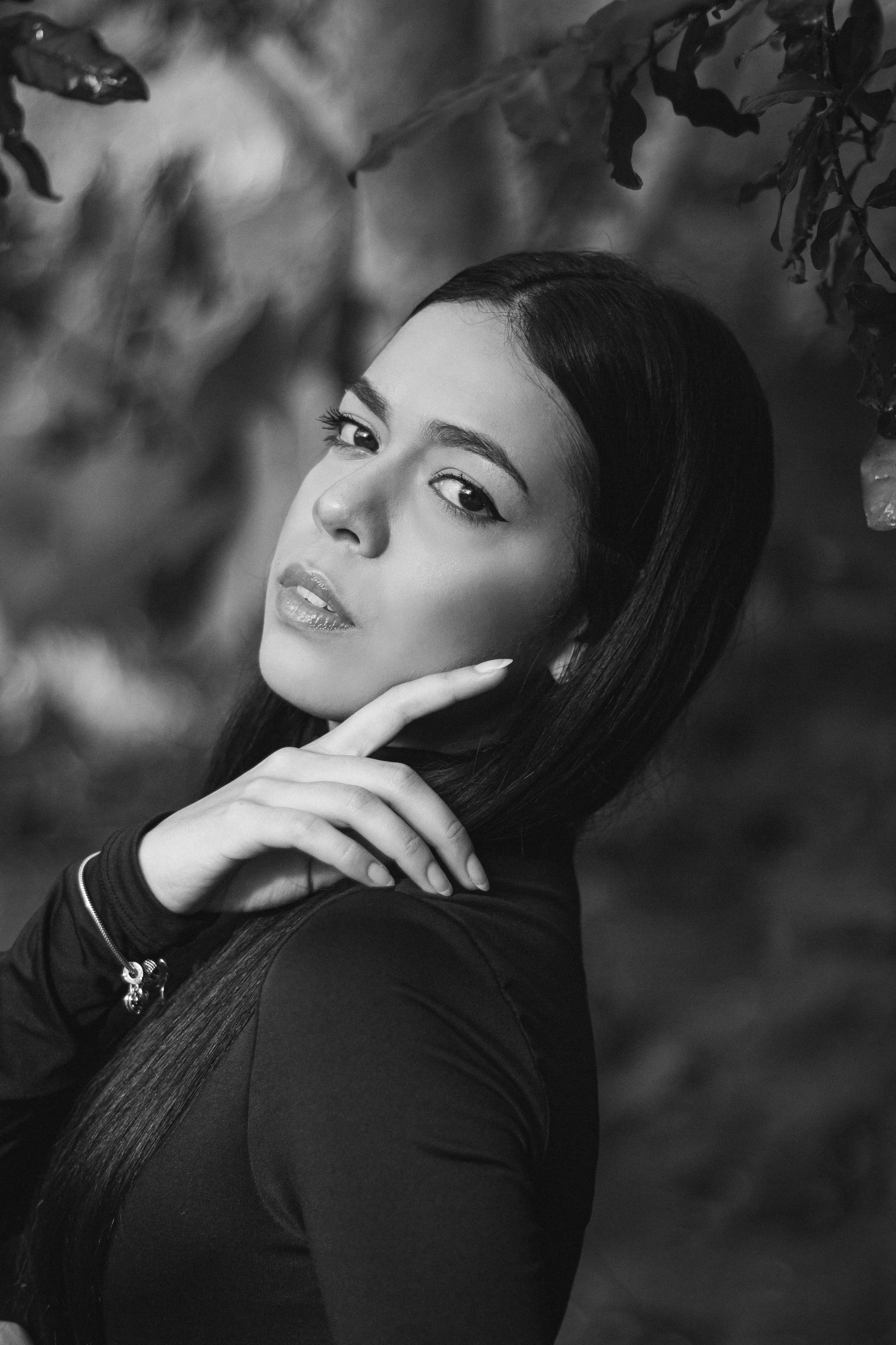 Woman Portrait behind Hands · Free Stock Photo