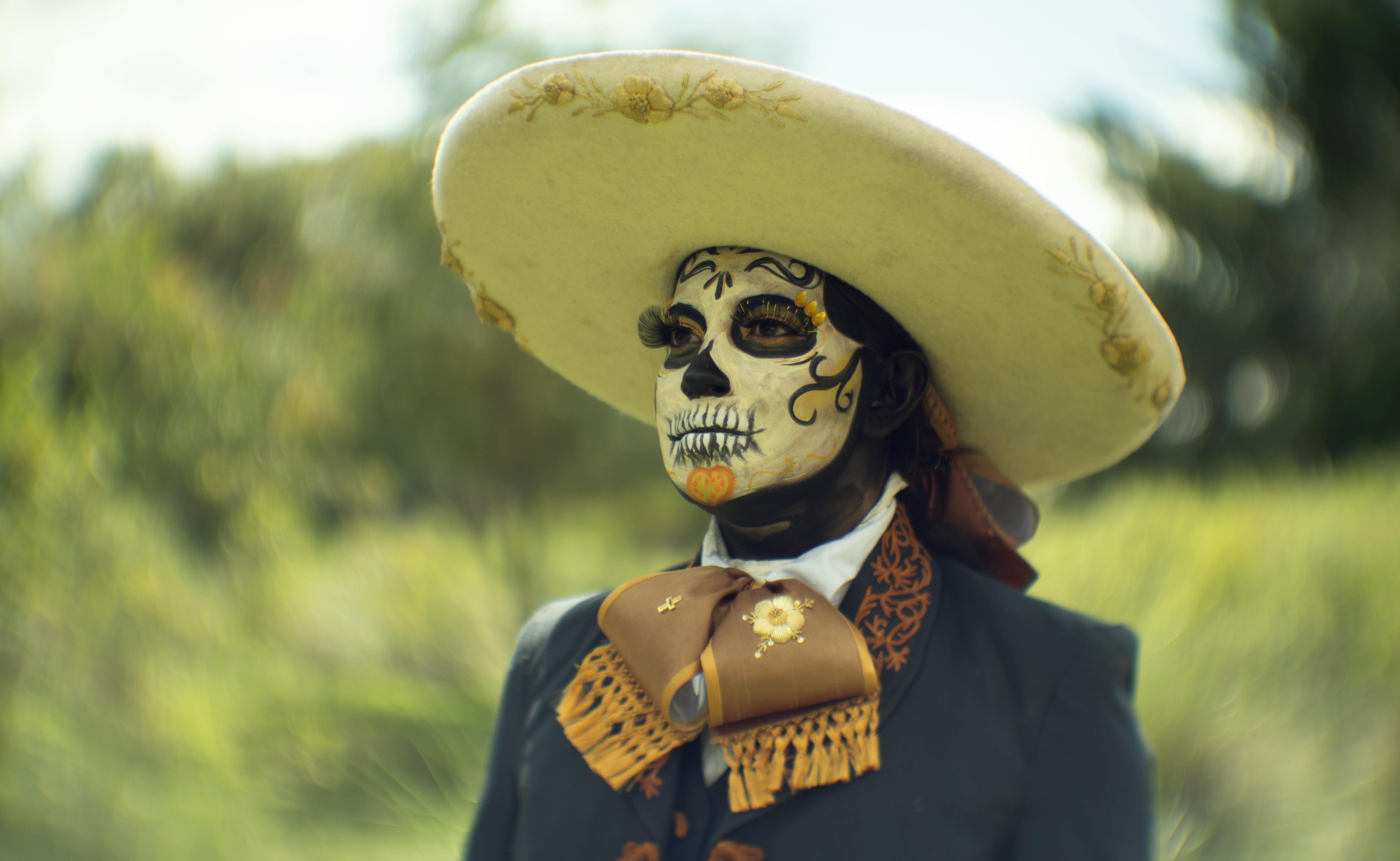 A man with a skull face and a sombrero · Free Stock Photo