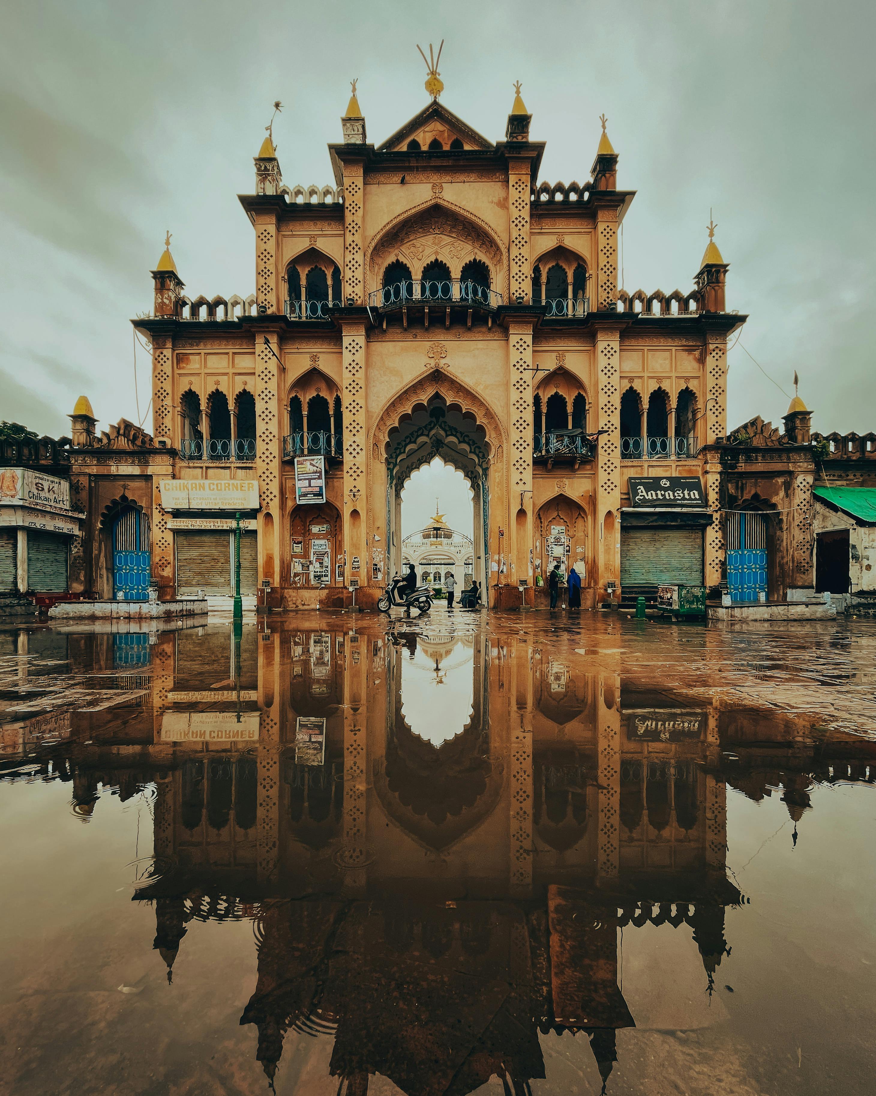 Entrance Gate to Chhota Imambara Monument in India Reflecting in Water ...