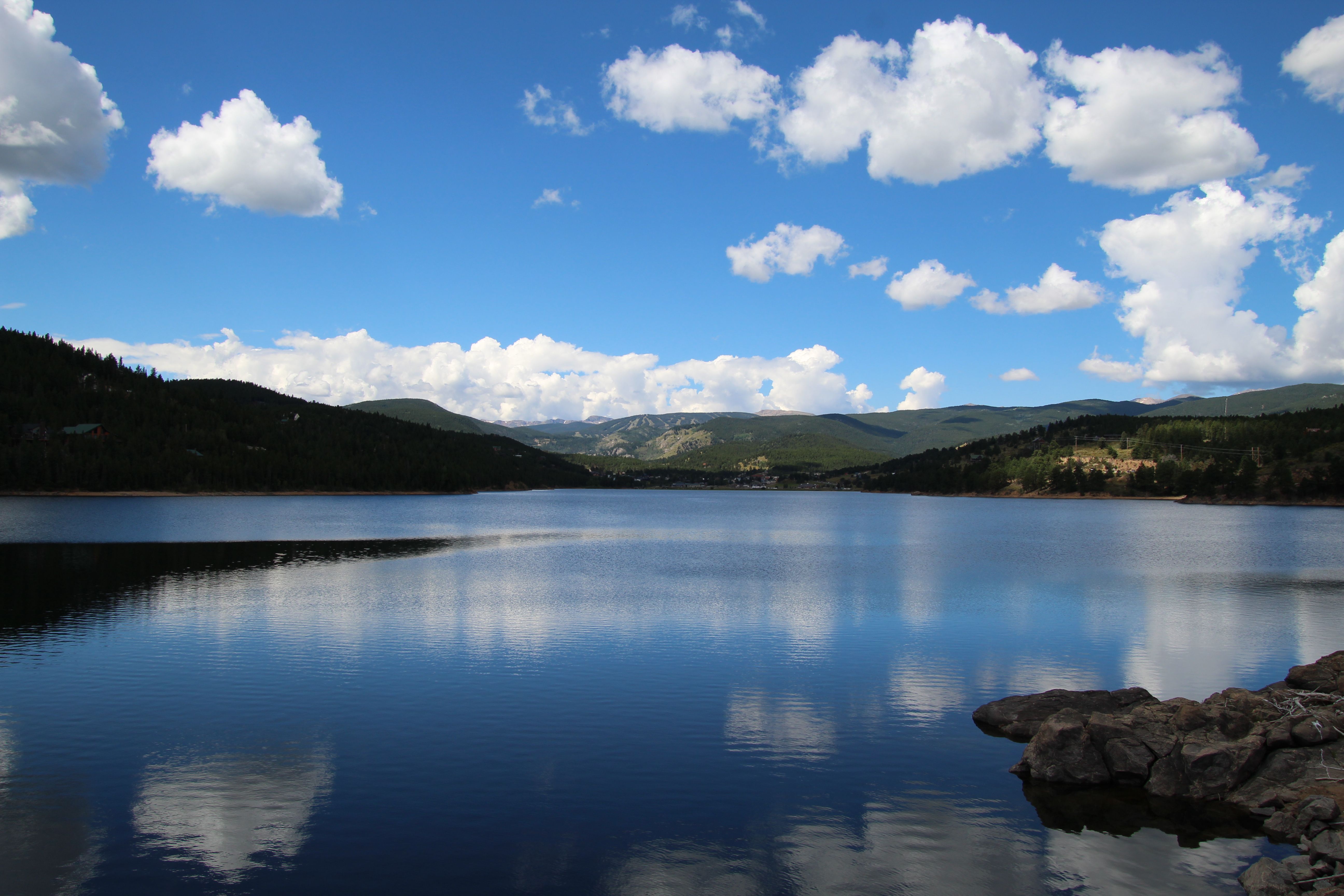 Panorama of a Placid Lake between Hills · Free Stock Photo